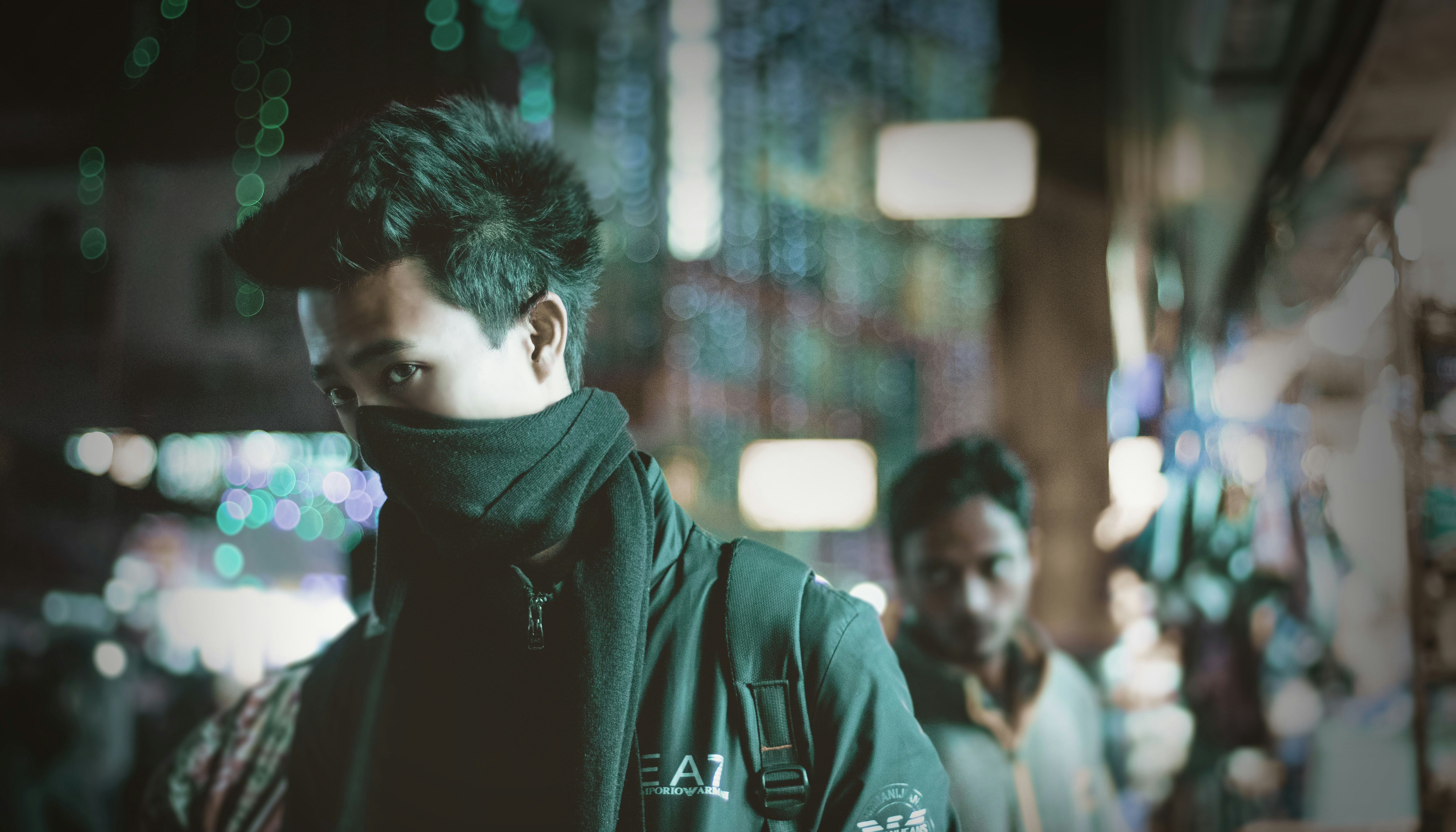 Masked Presence in a Neon Night Market