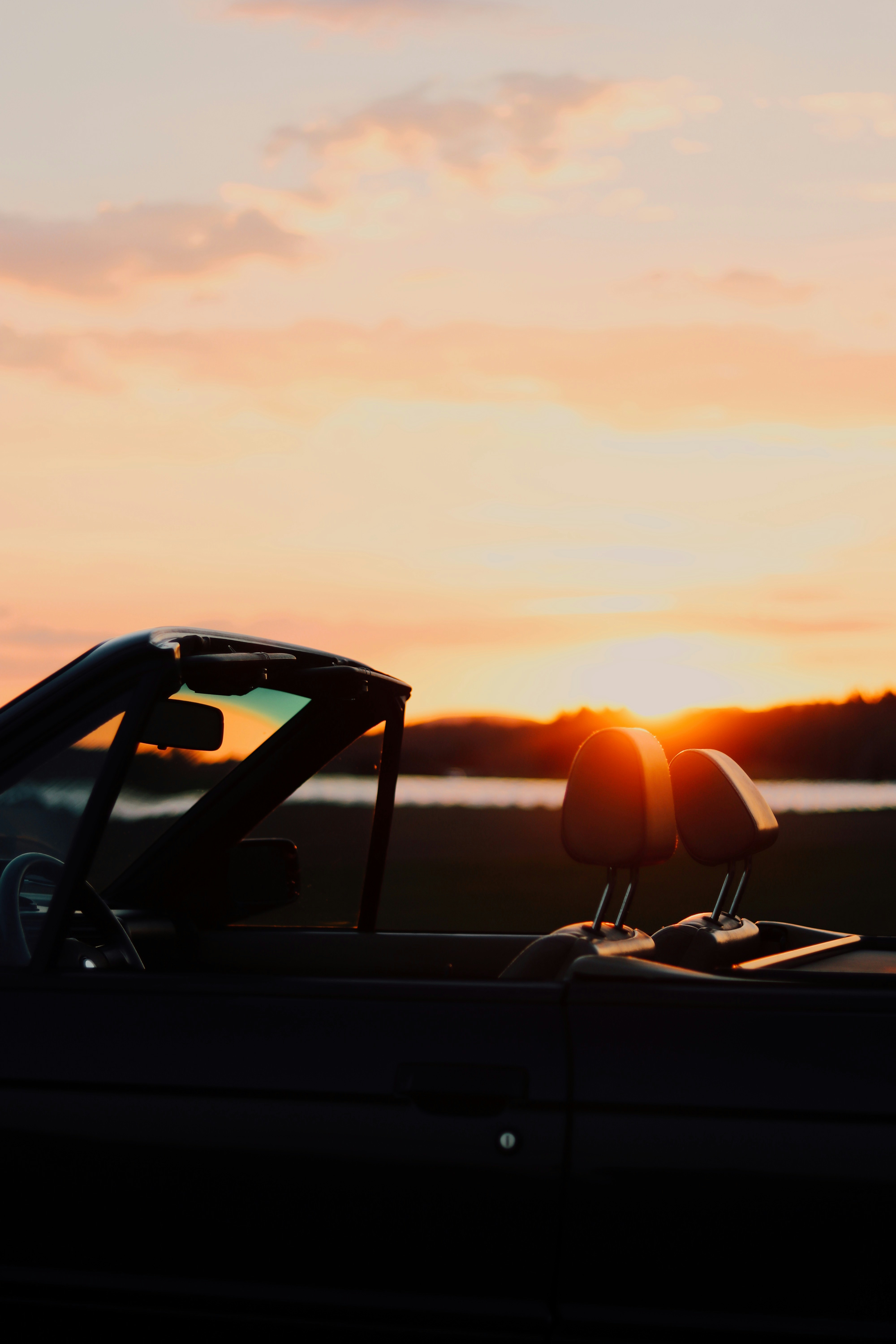 Grayscale photography of vehicle photo – Free Sunset Image on Unsplash