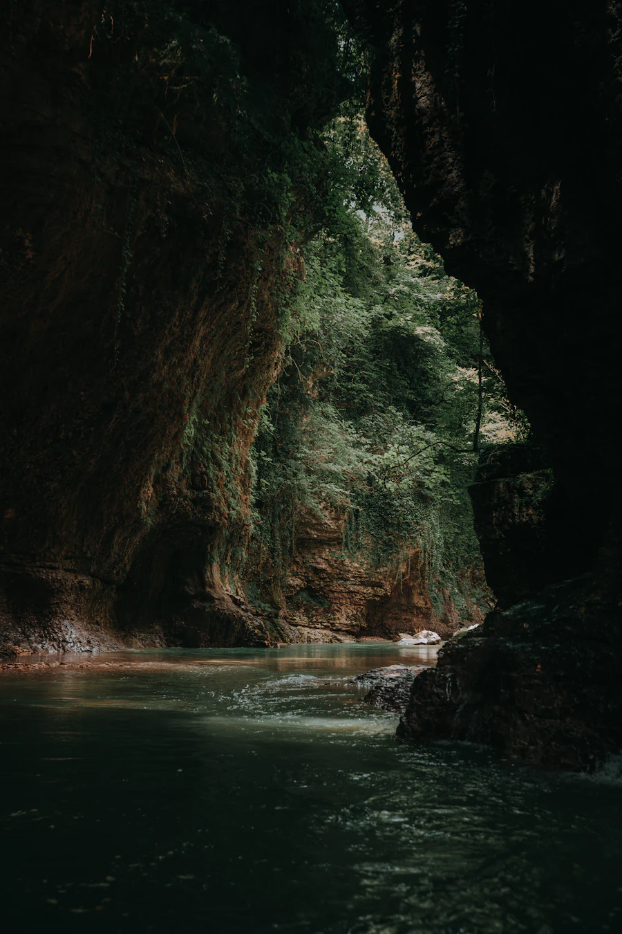 Some deep green mood from Martvili Canyon, located in Semegrelo-Zemo Svaneti province of Georgia. | calm body of water inside cave at daytime