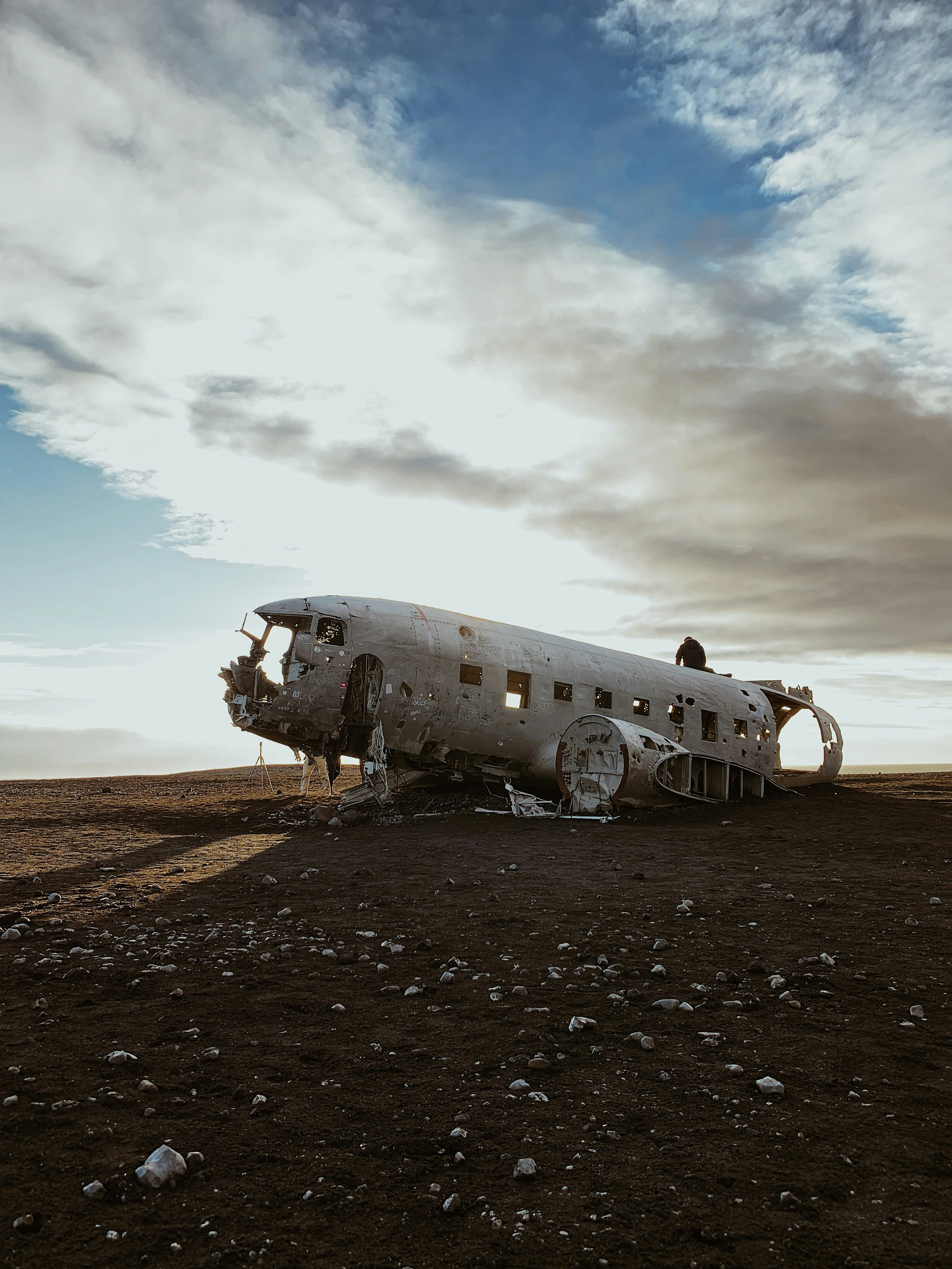 Wrecked and abandoned airplane on dirt field photo – Free Path to ...