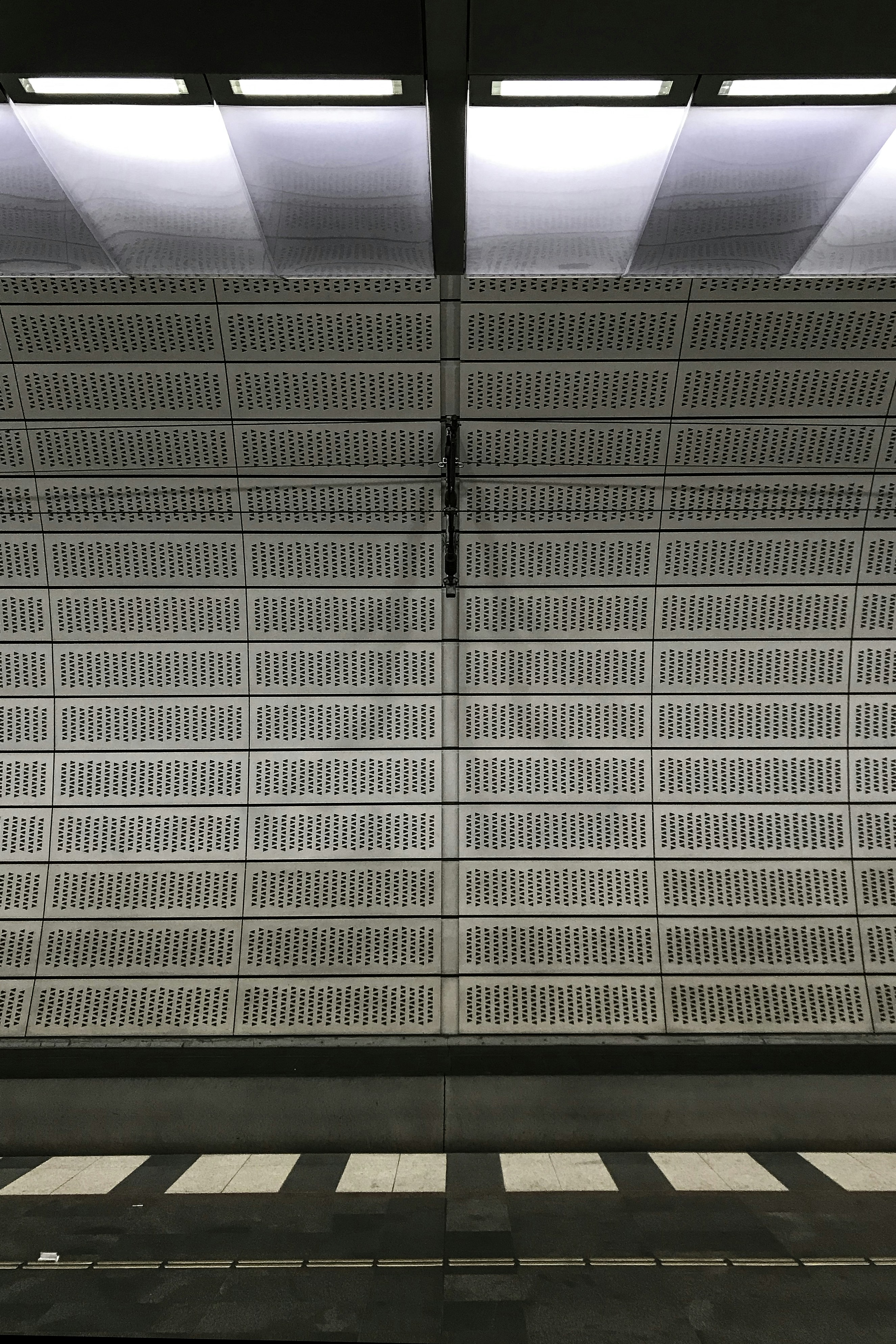 Gridscape Above the Tracks: Perforated Ceiling Geometry in a Subway