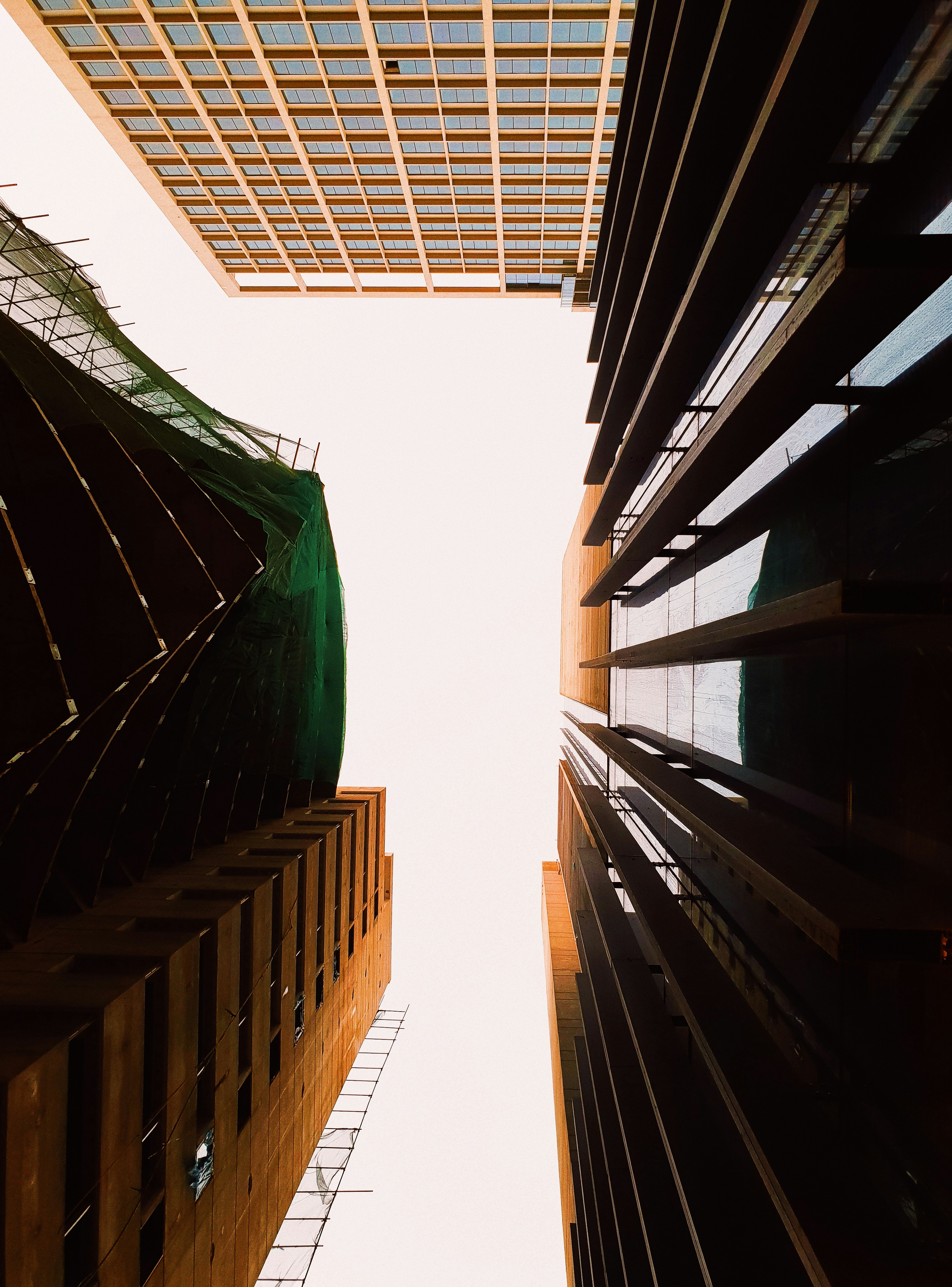 Worm's-eye view photography of b uilding photo – Free Brown Image on ...