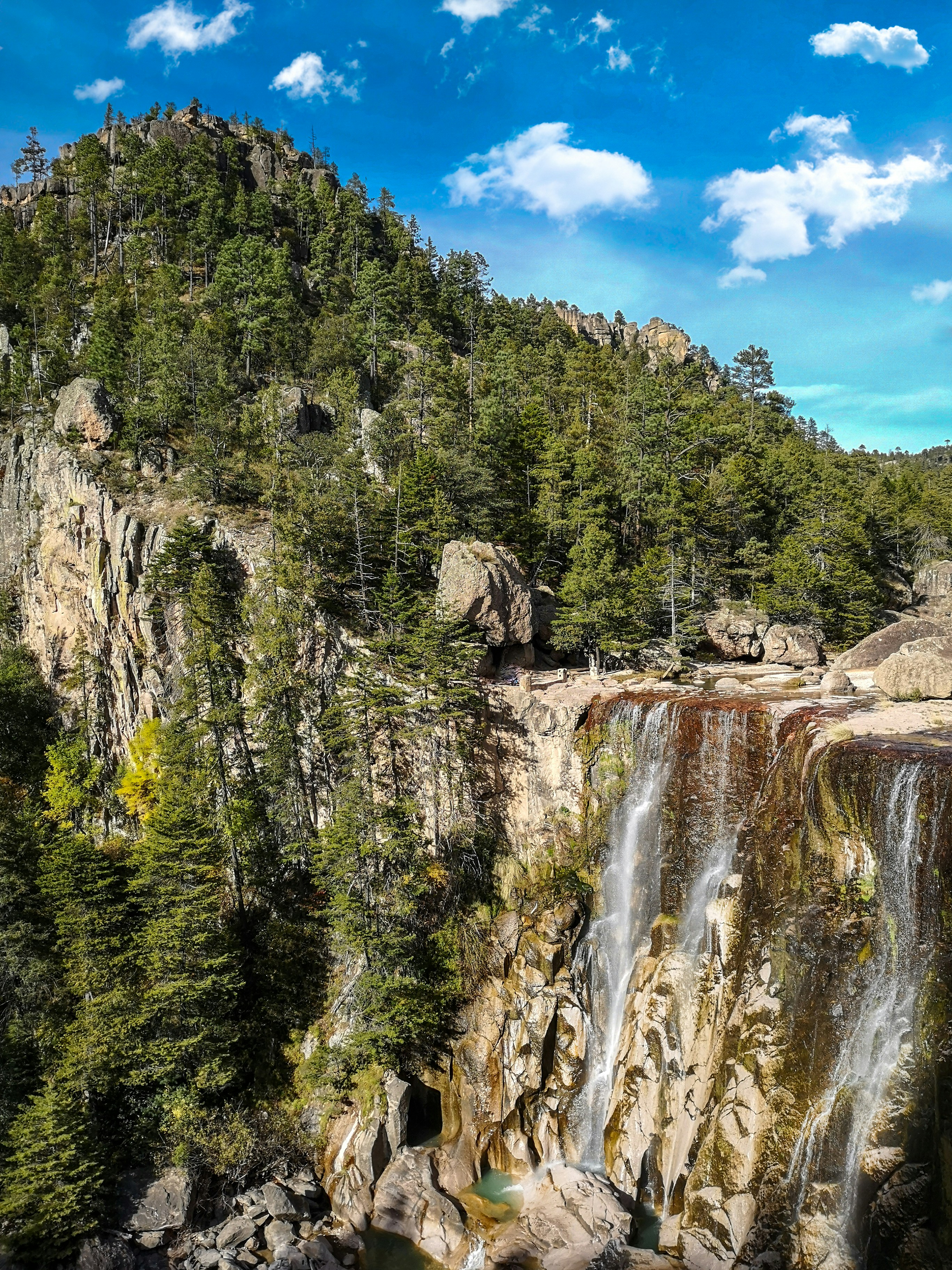 Sierra Tarahumara, México | waterfalls under blue sky