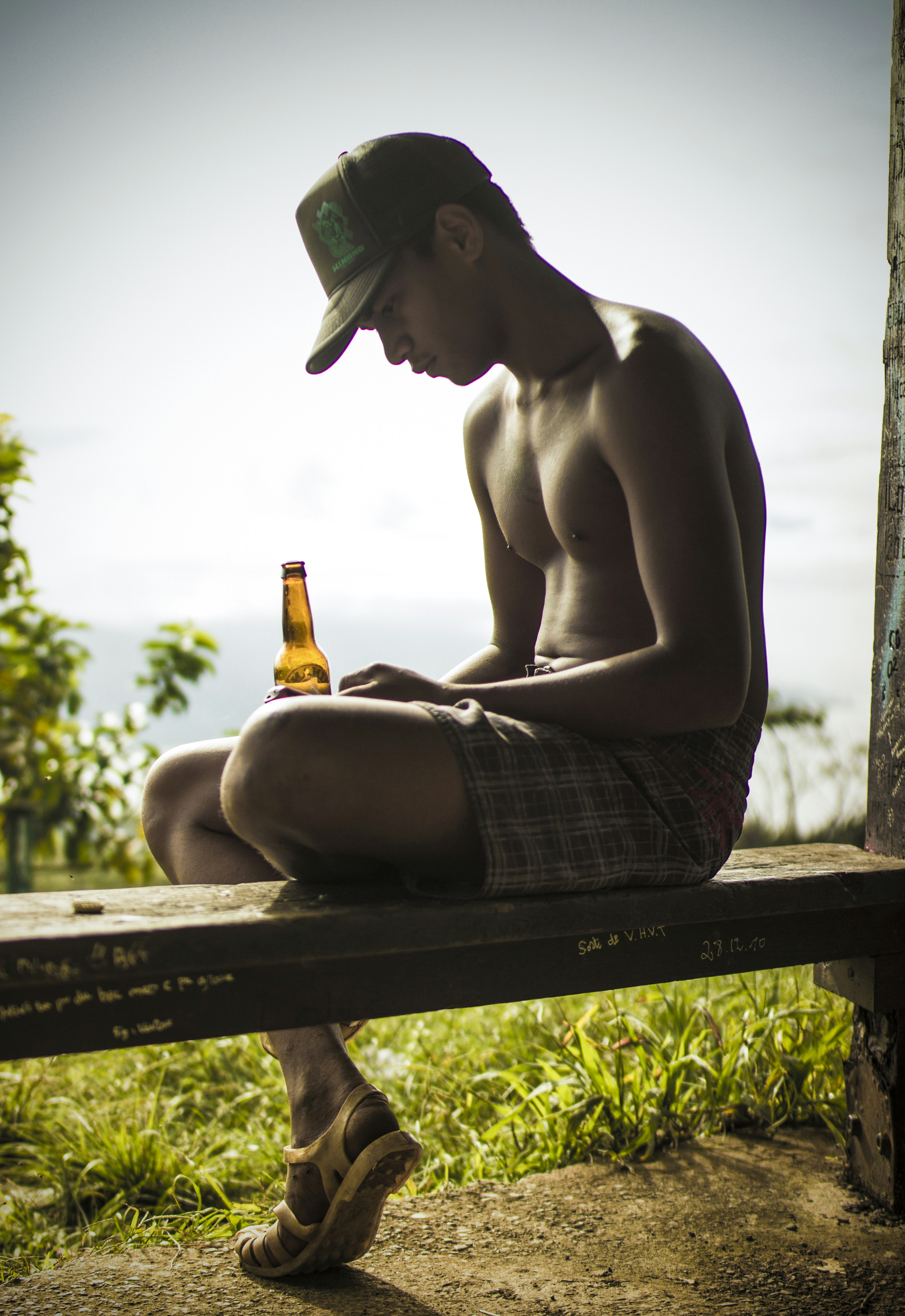 Solitude on the Veranda: A Quiet Moment with a Bottle