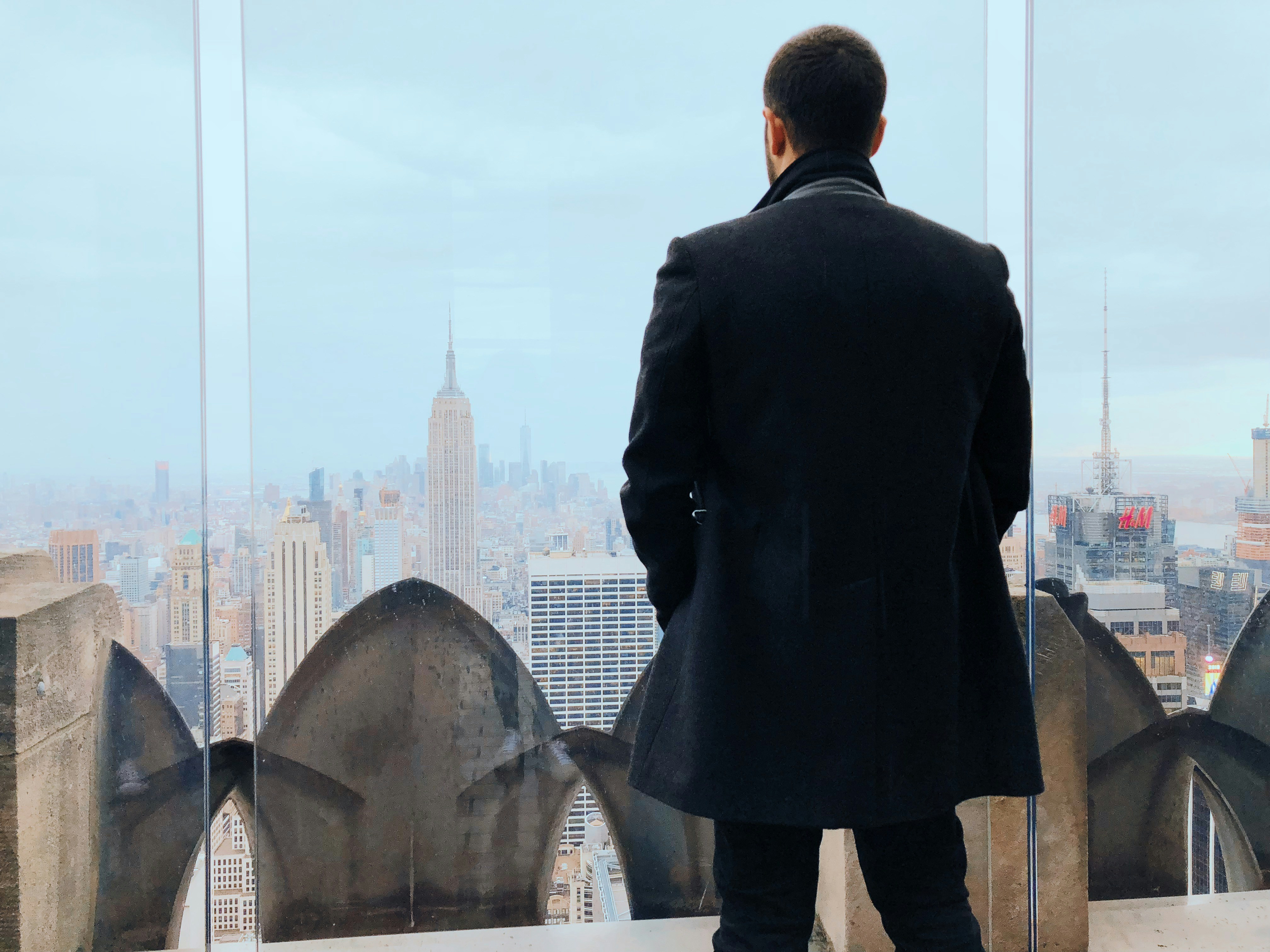 Man standing during daytime photo – Free Rockefeller plaza Image on ...