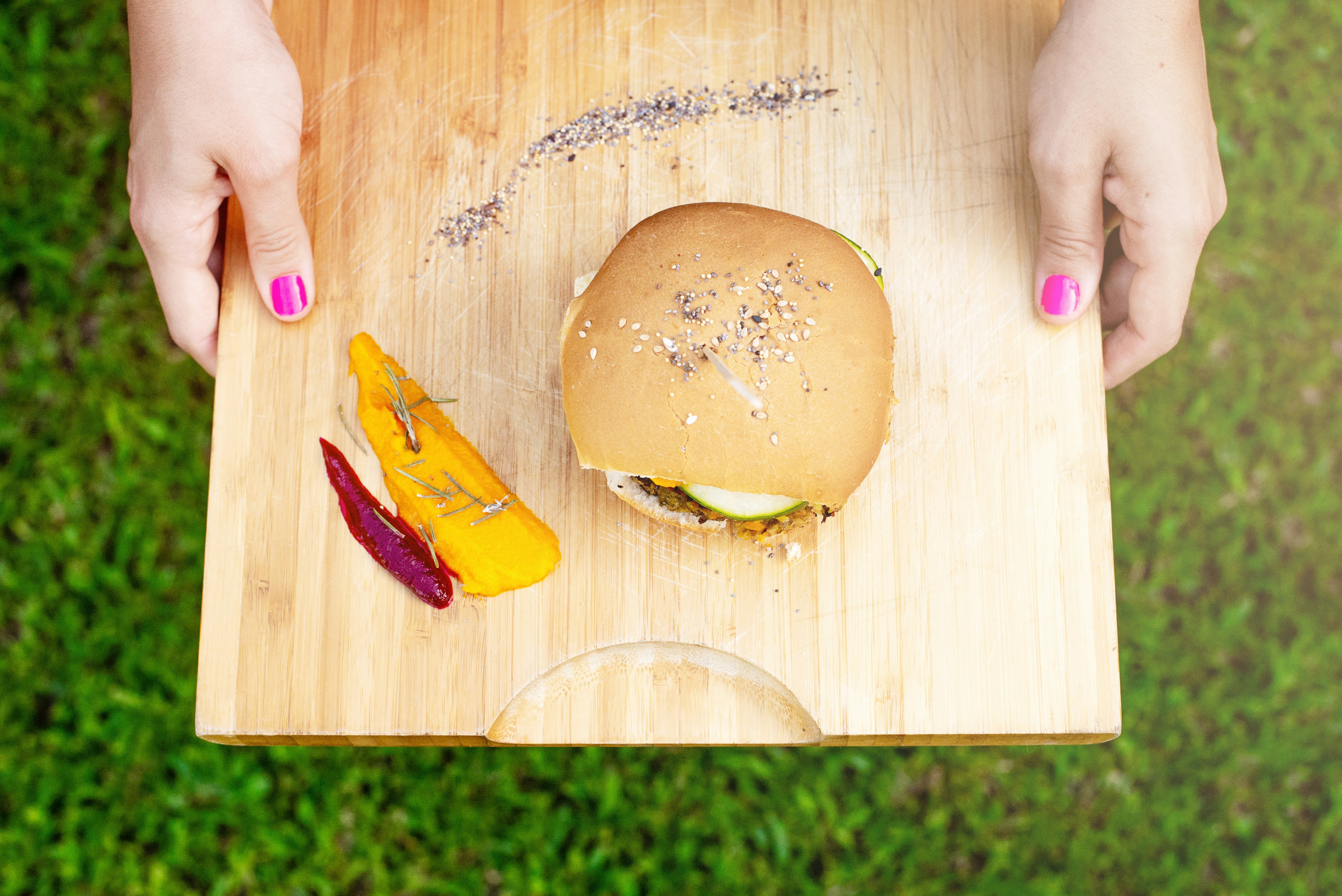 Gourmet Burger Presentation on Rustic Board