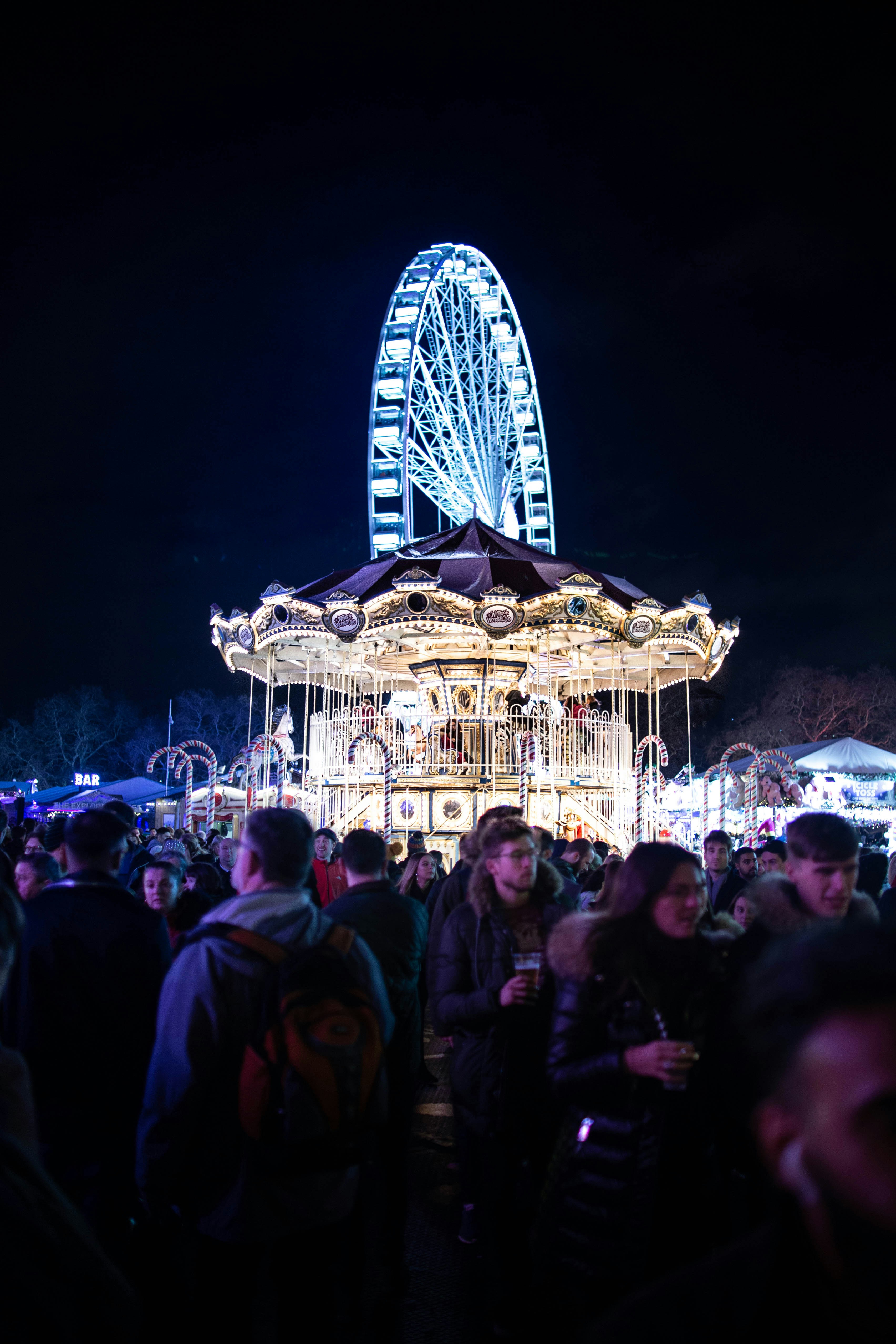 People standing near carousel during night time photo – Free Hyde park ...