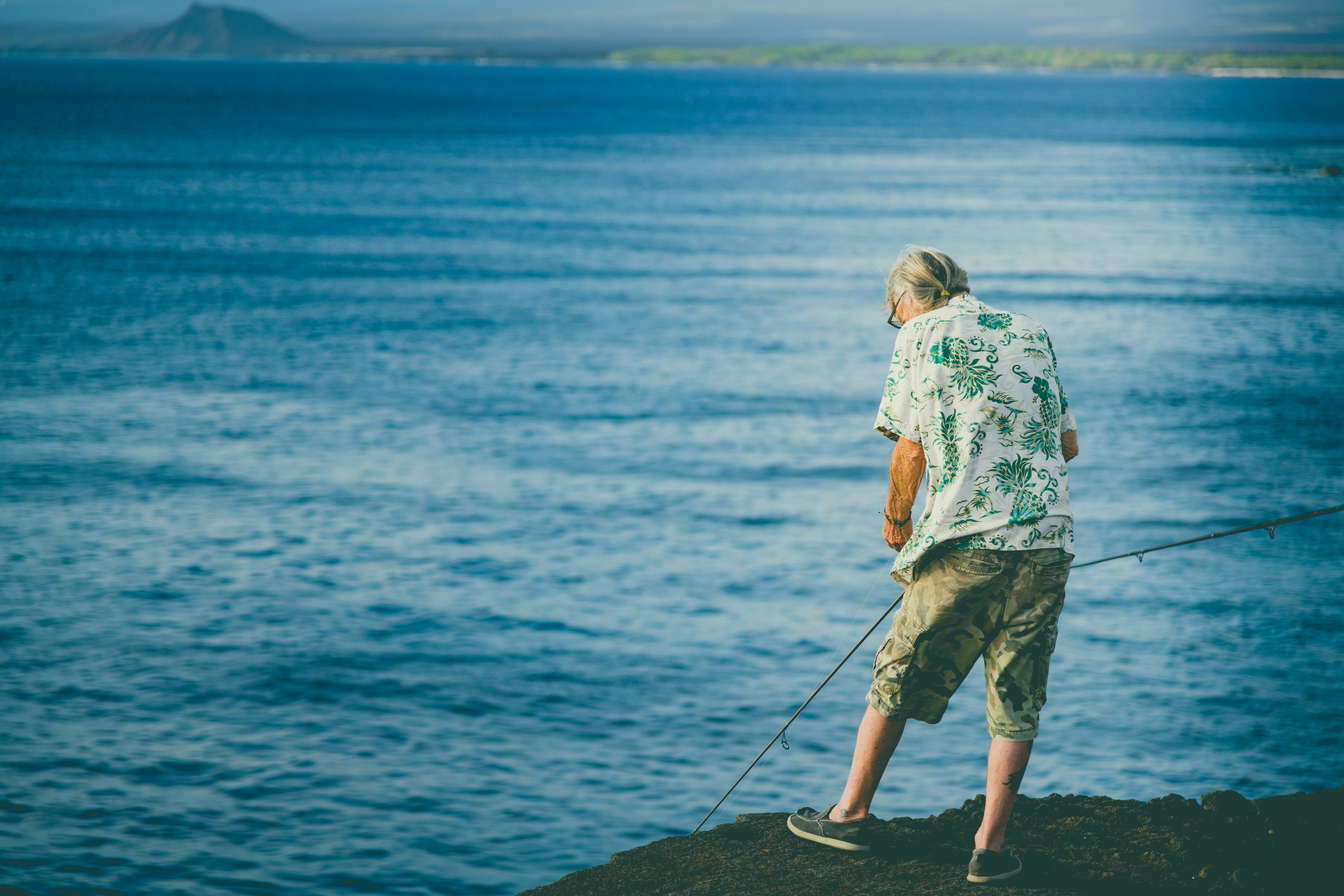 The art of fishing | man standing on the seashore