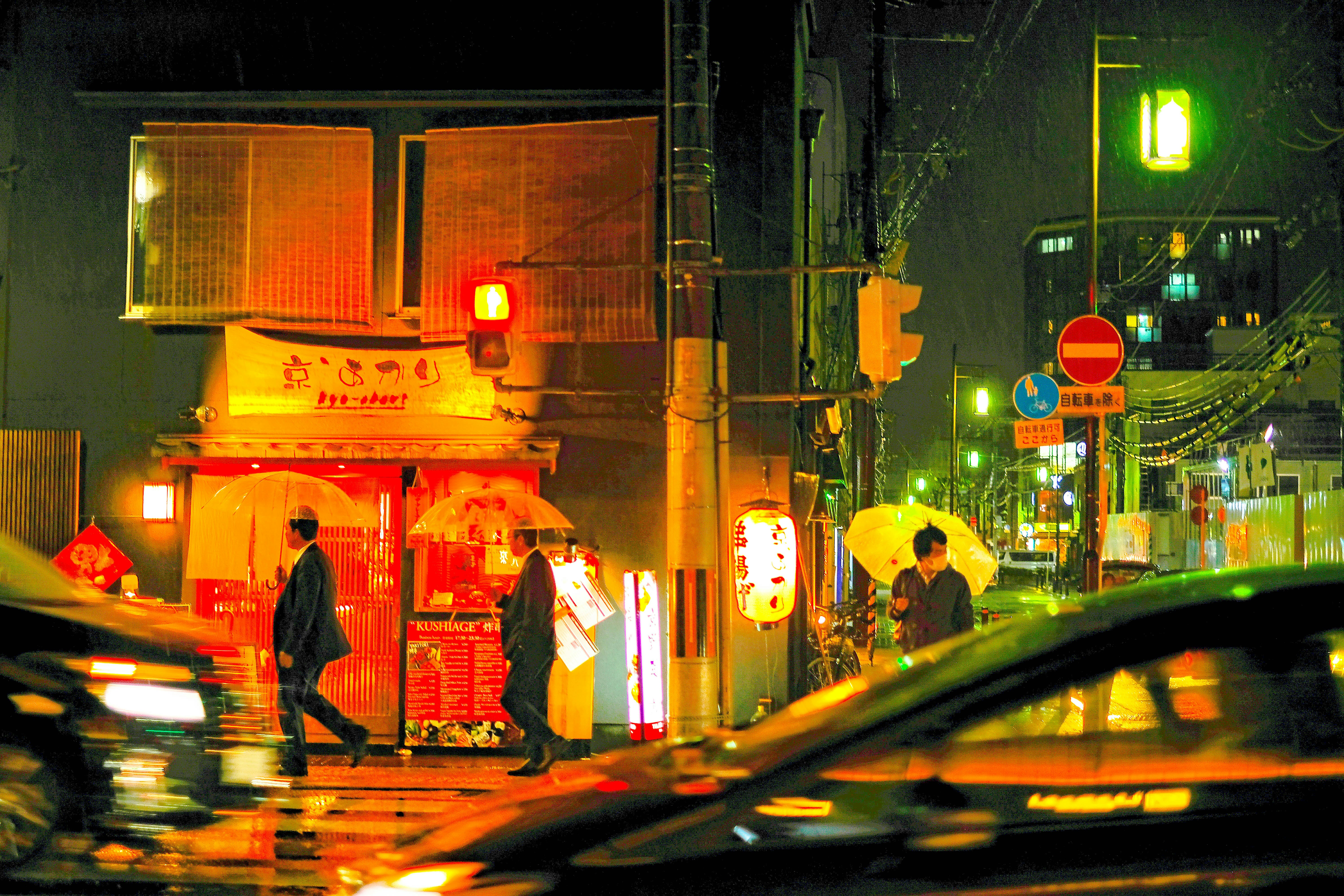 Neon Lanterns and Rain-Slick Street by a Cozy Corner Shop