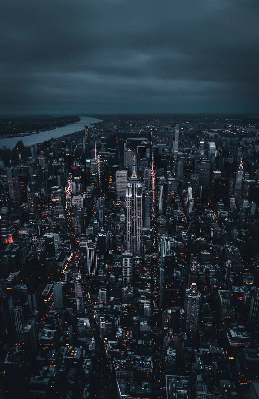 Empire State Building. | aerial photo of city skyline at night