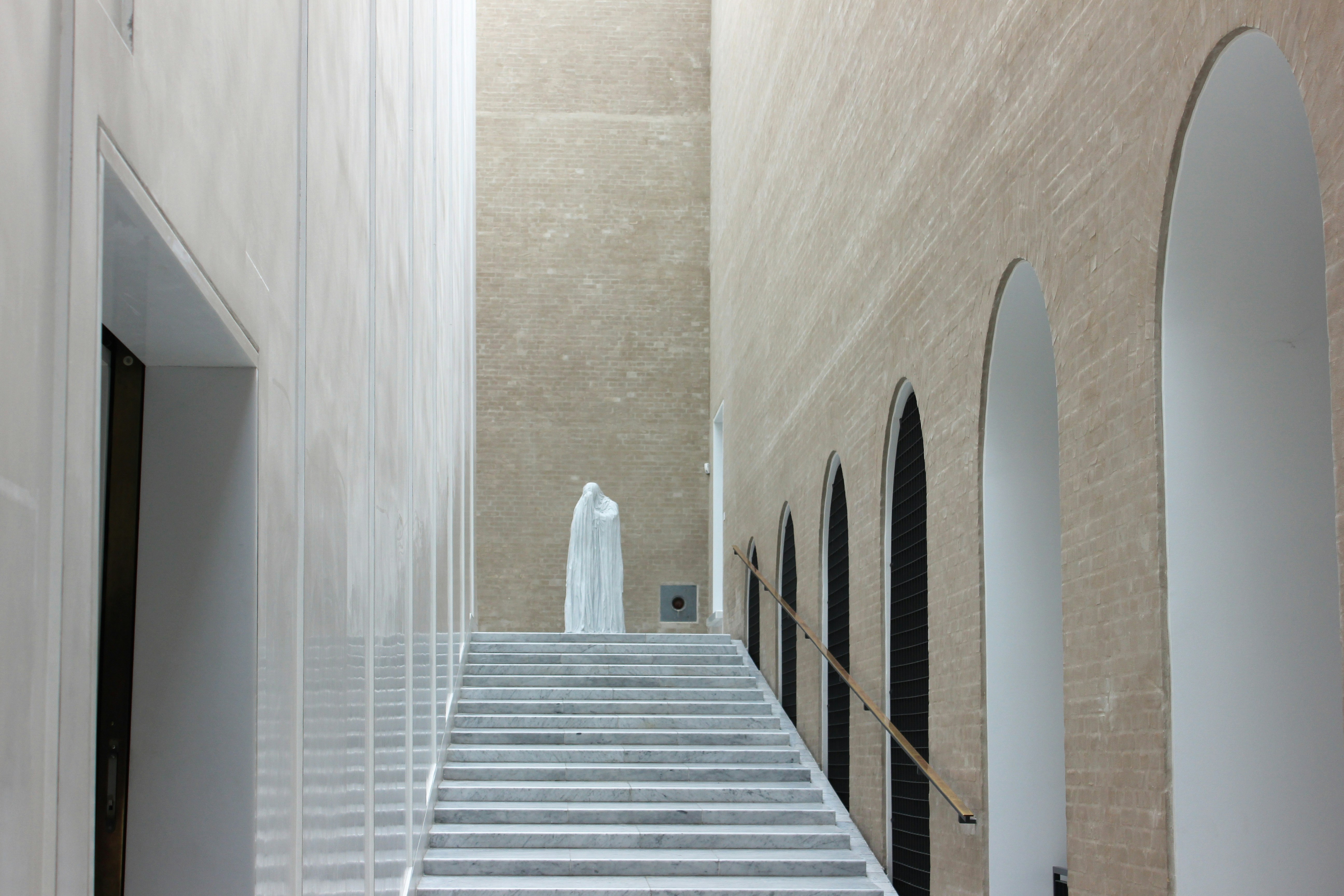 Human size statue inside building near blue photo – Free Architecture ...