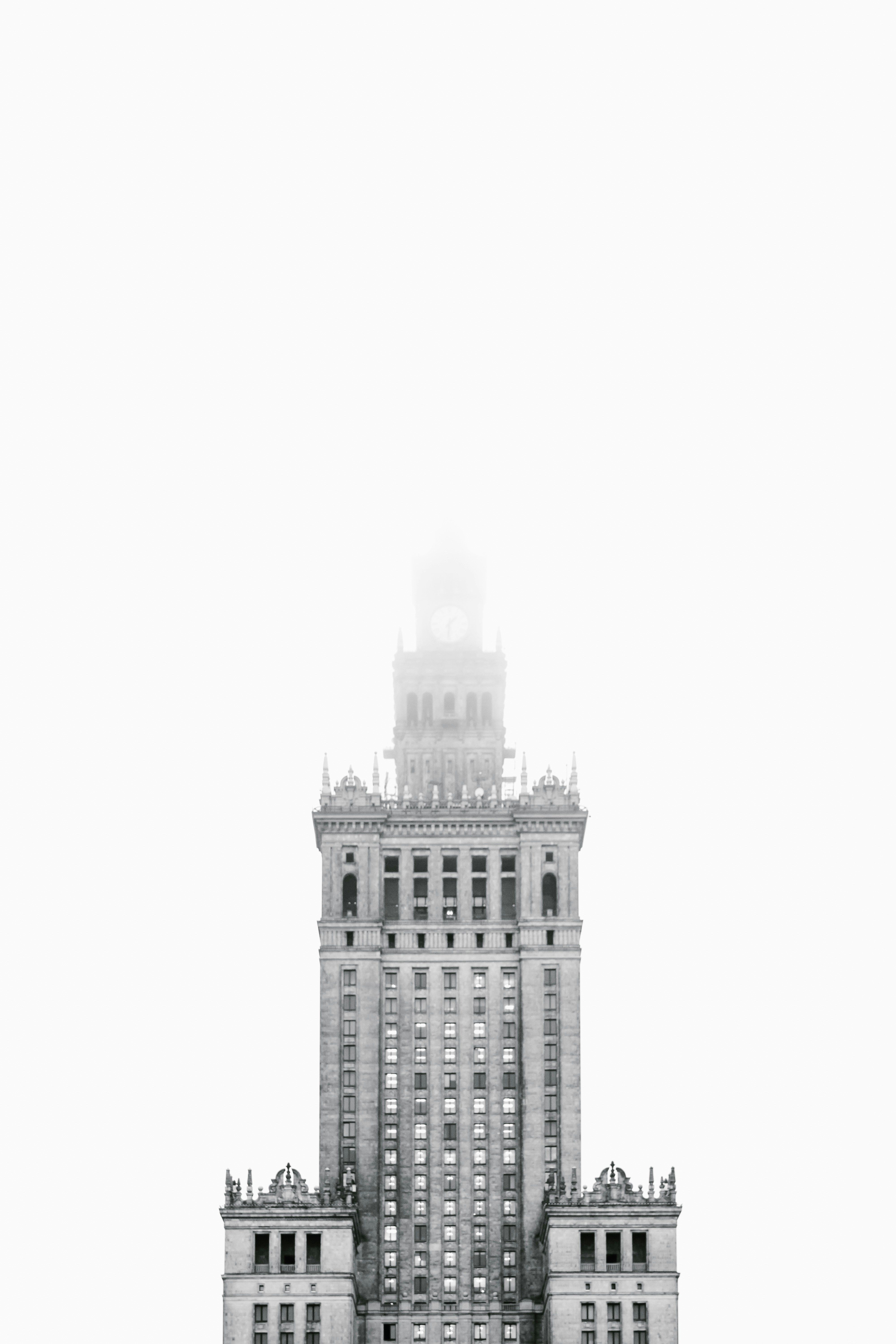 Crown of the Cloud: A Fog-Washed Spire Emerging from White
