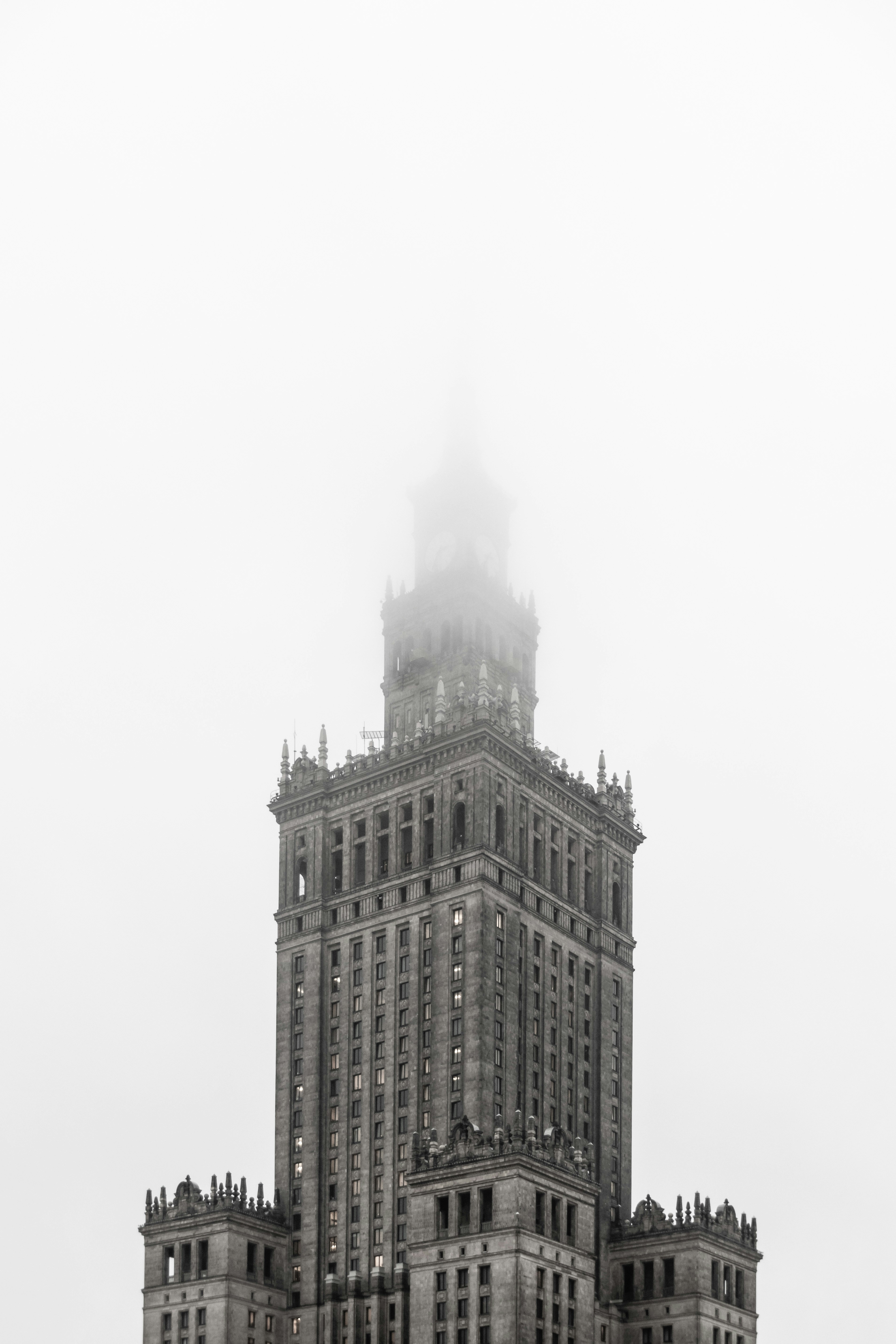 Mist-Clad Spire: A Gothic Tower Emerging Through the Fog