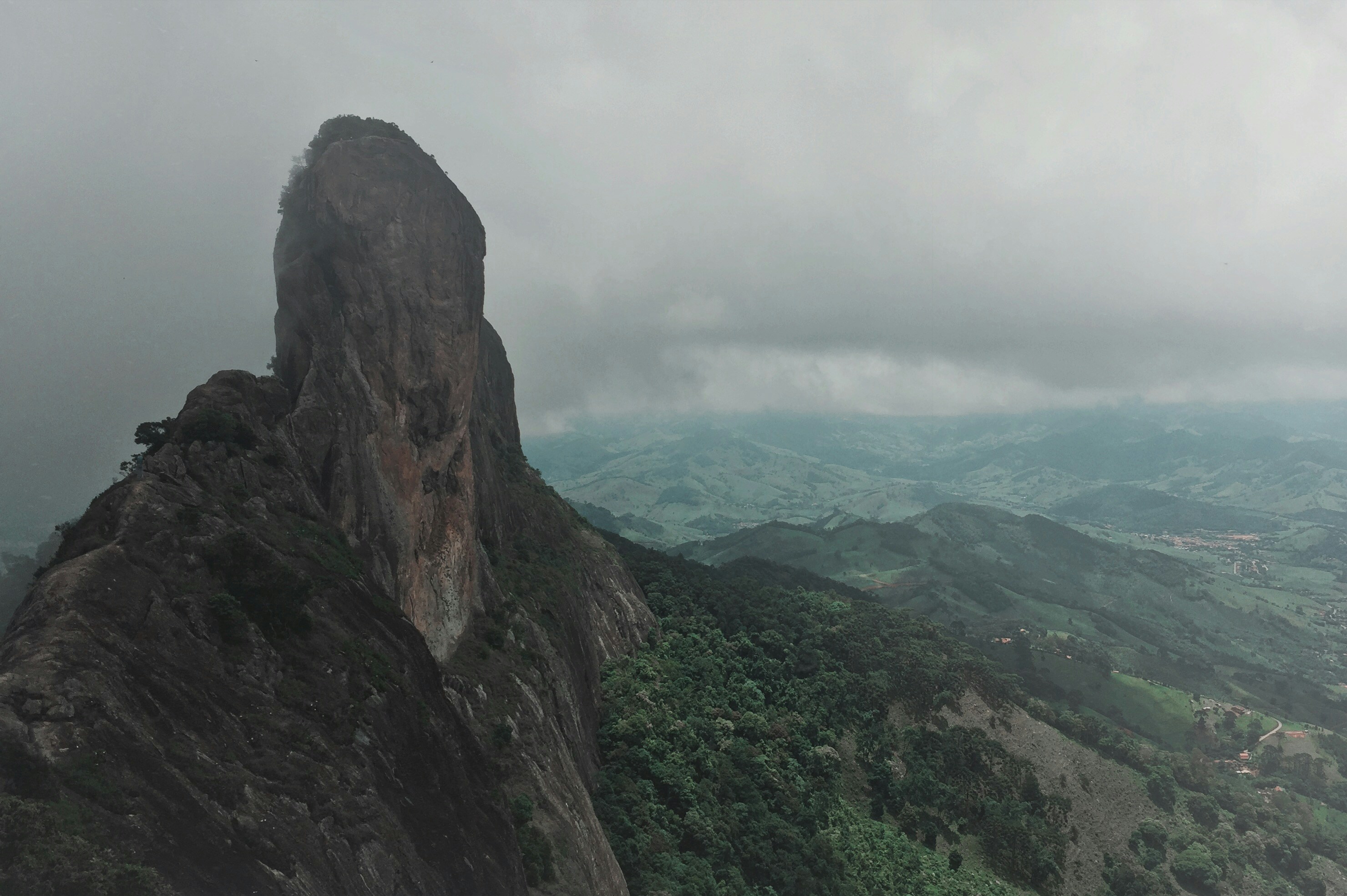Majestic Peak Amidst Rolling Clouds