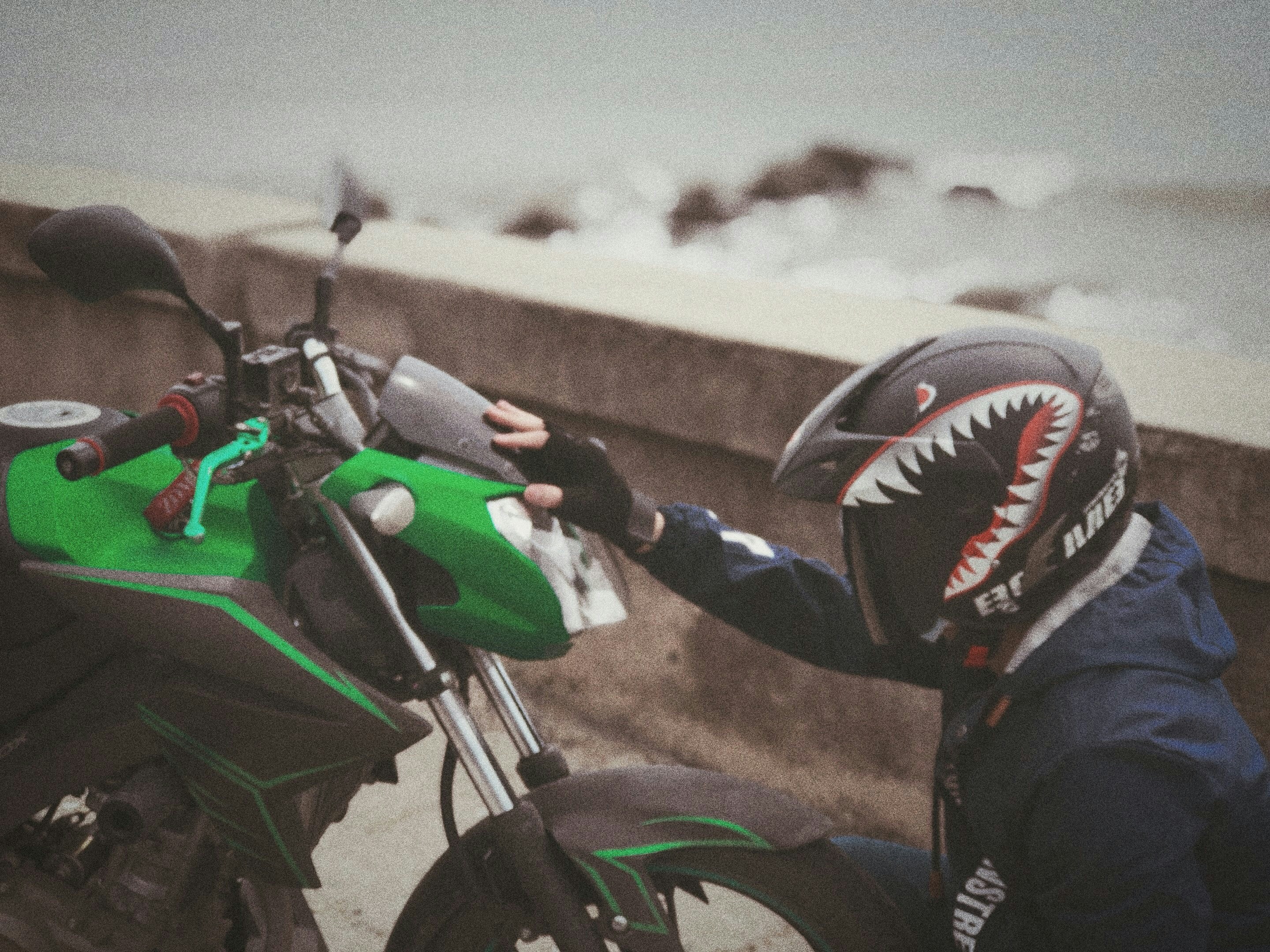 Shark-Helmet Grip on a Neon Green Street Beast
