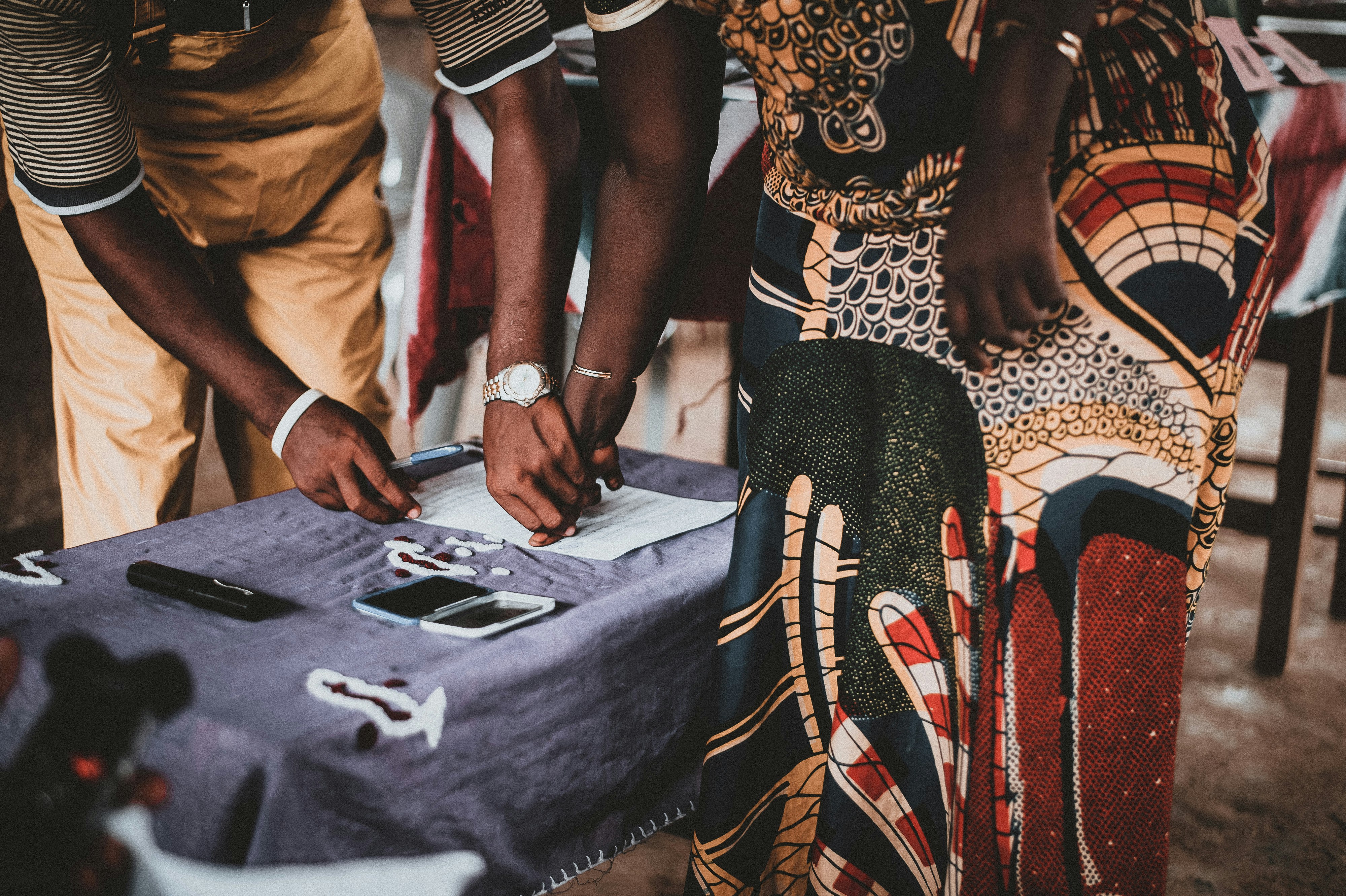 Person putting thumb mark on paper photo – Free Human Image on Unsplash