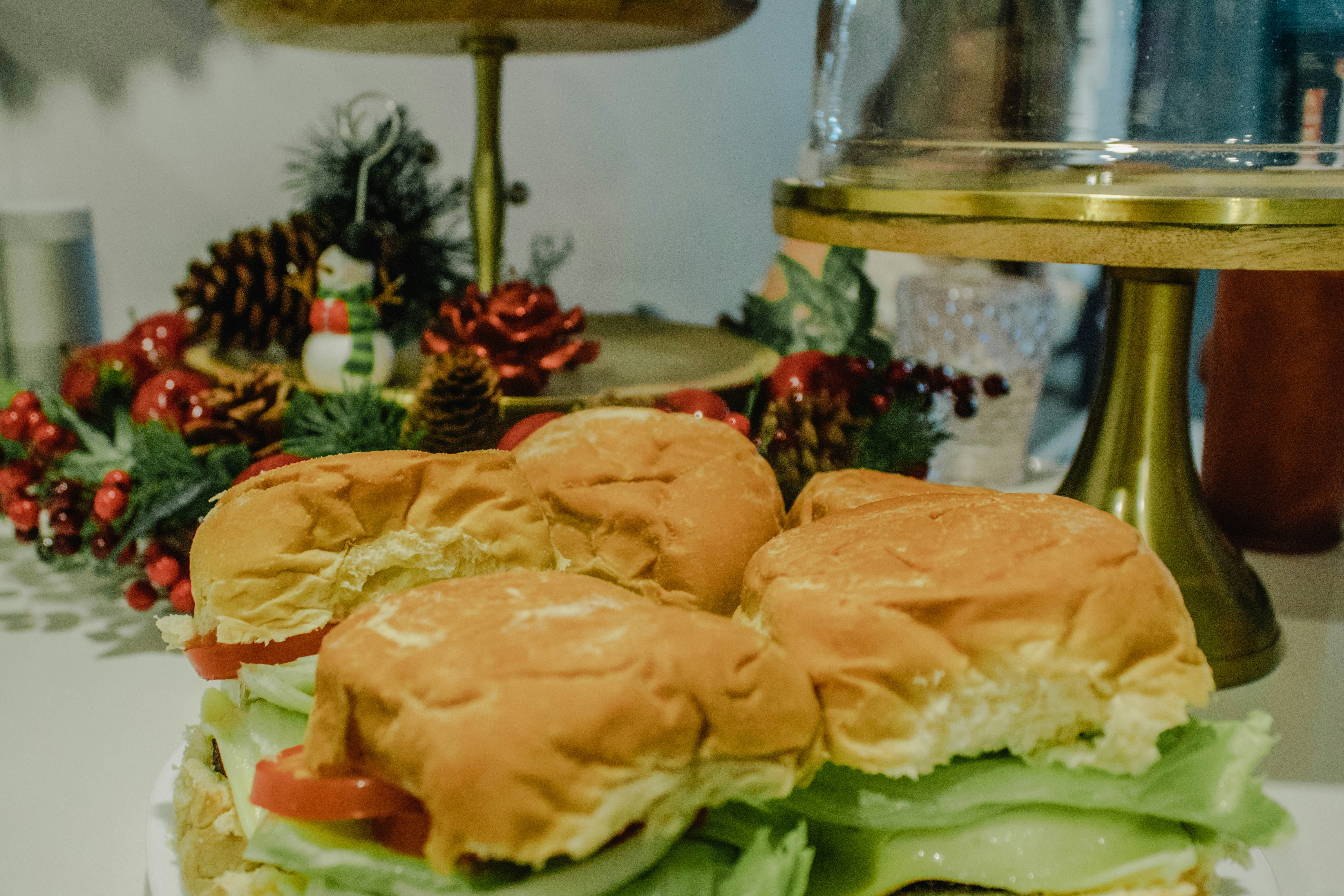 four burgers on table