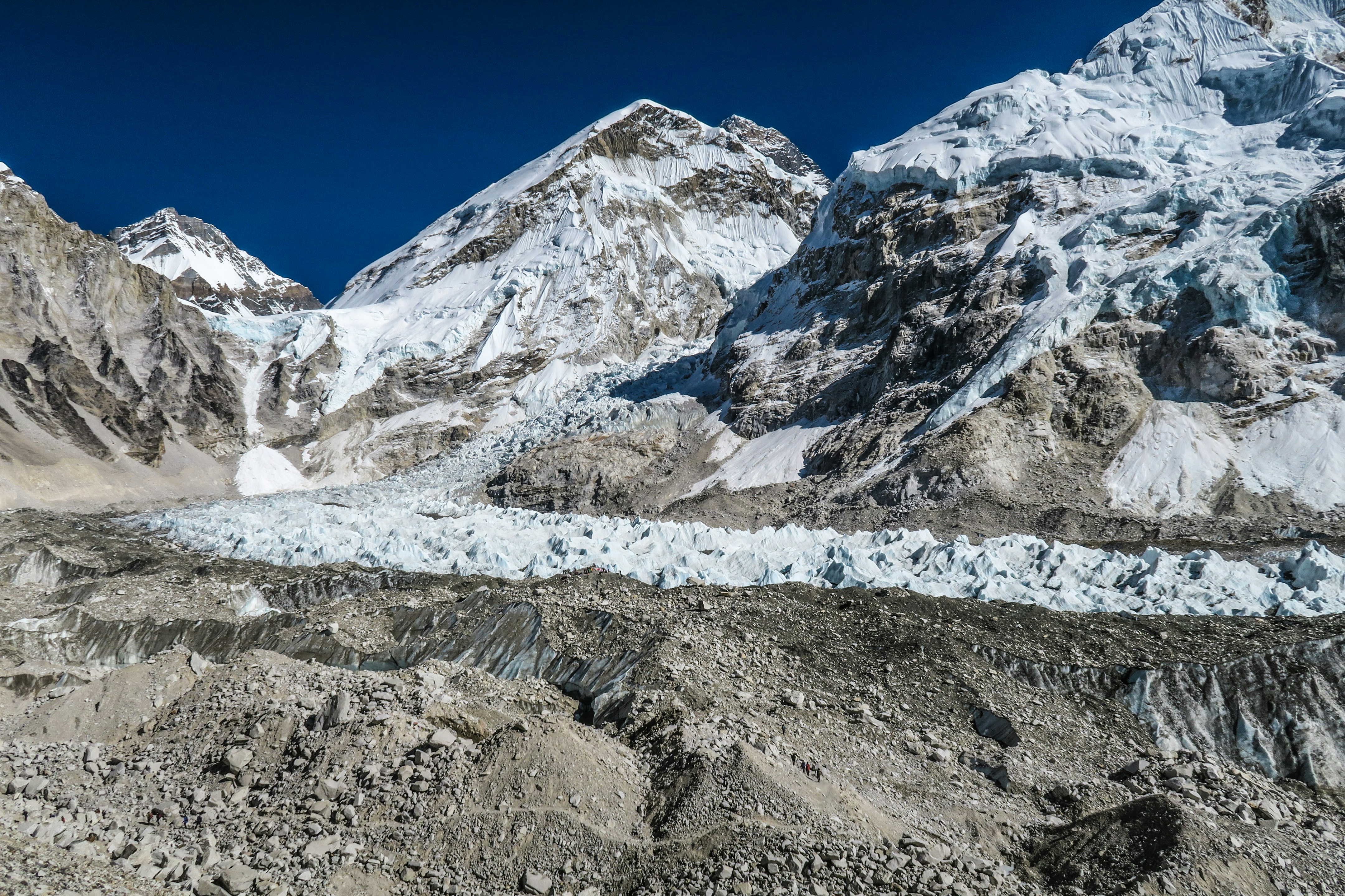 Khumbu Icefall | snow covered rocky mountain during daytime
