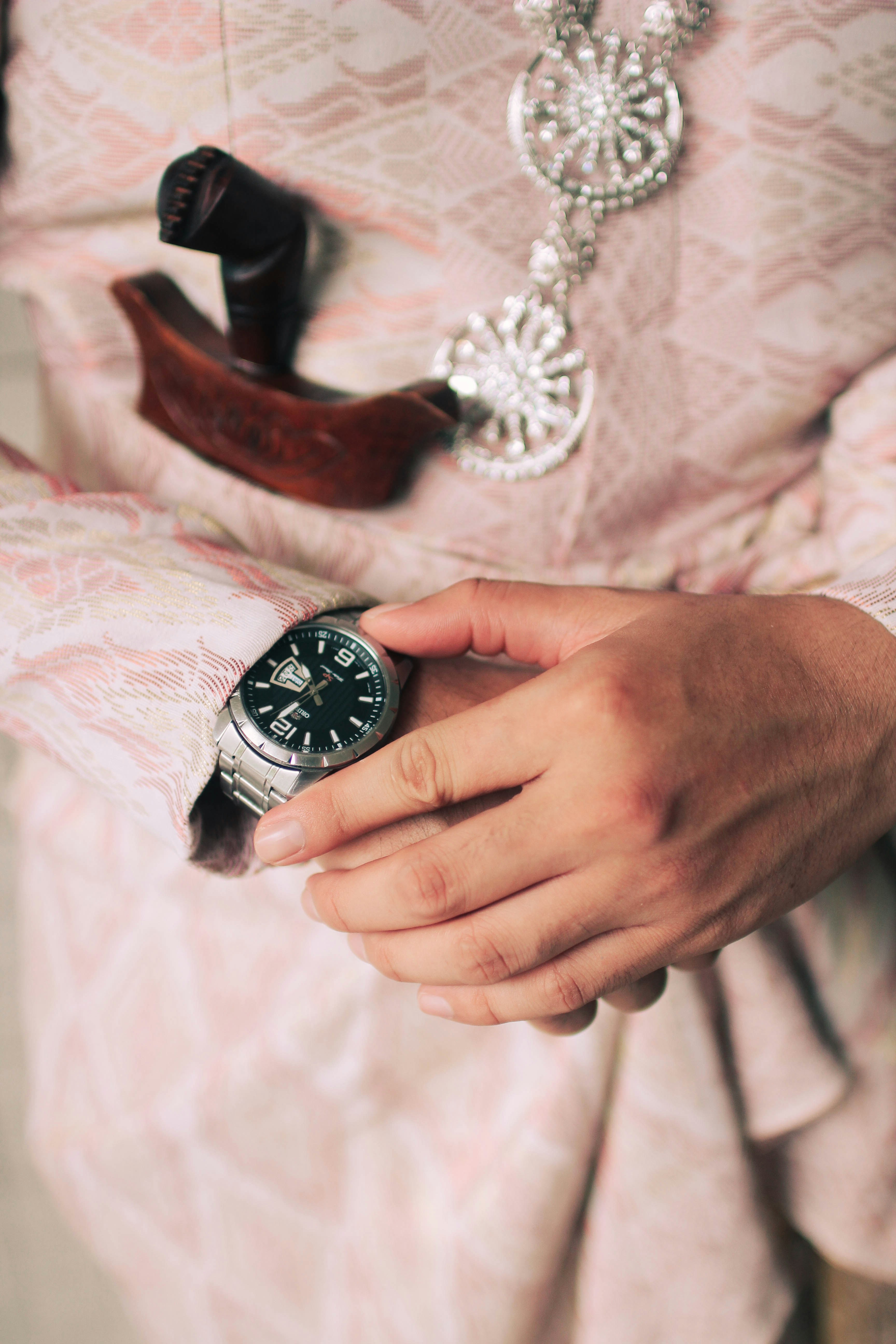 Elegance in Focus: A Timeless Moment with a Silver Watch