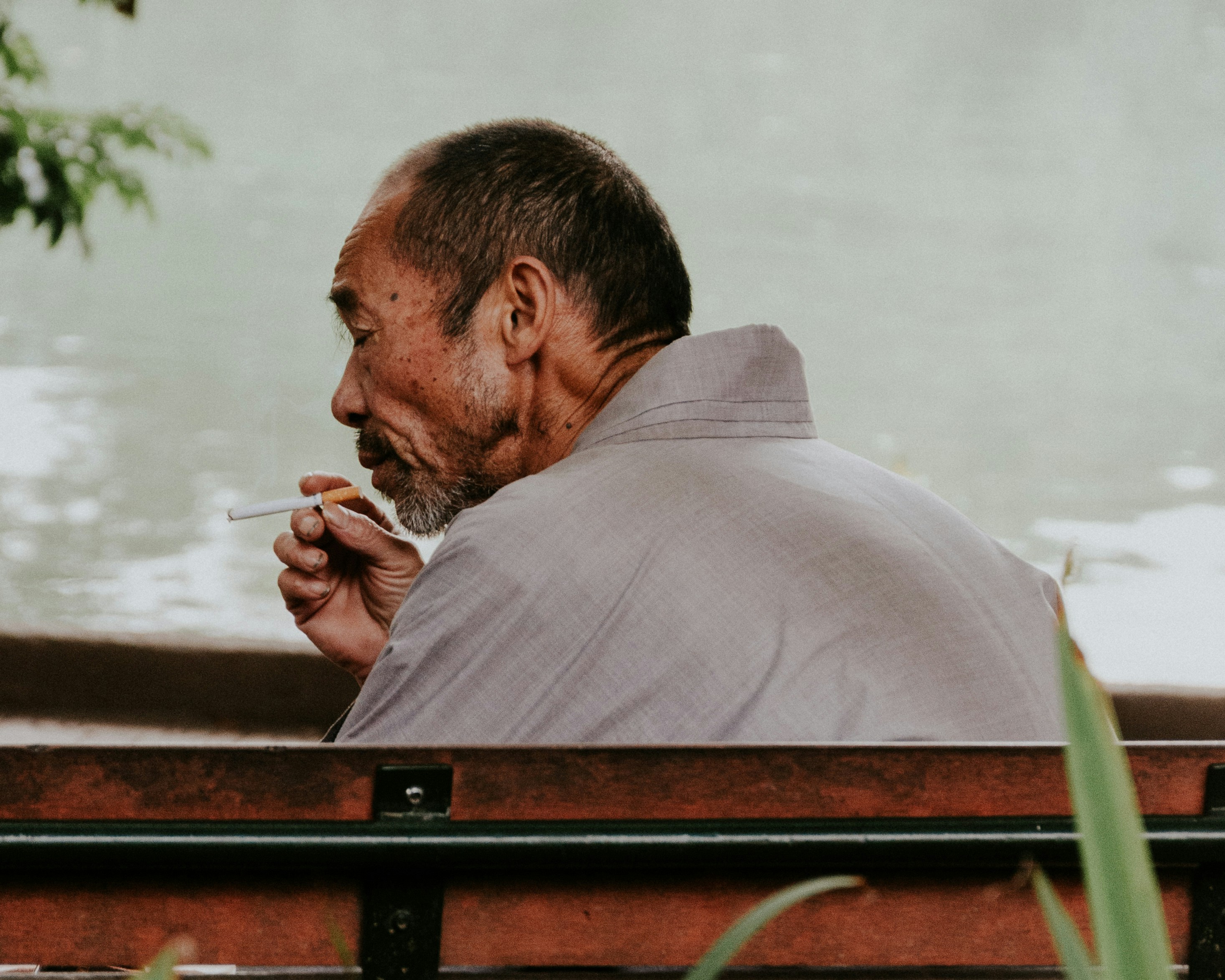 Man using red cigarette photo – Free Smoke Image on Unsplash