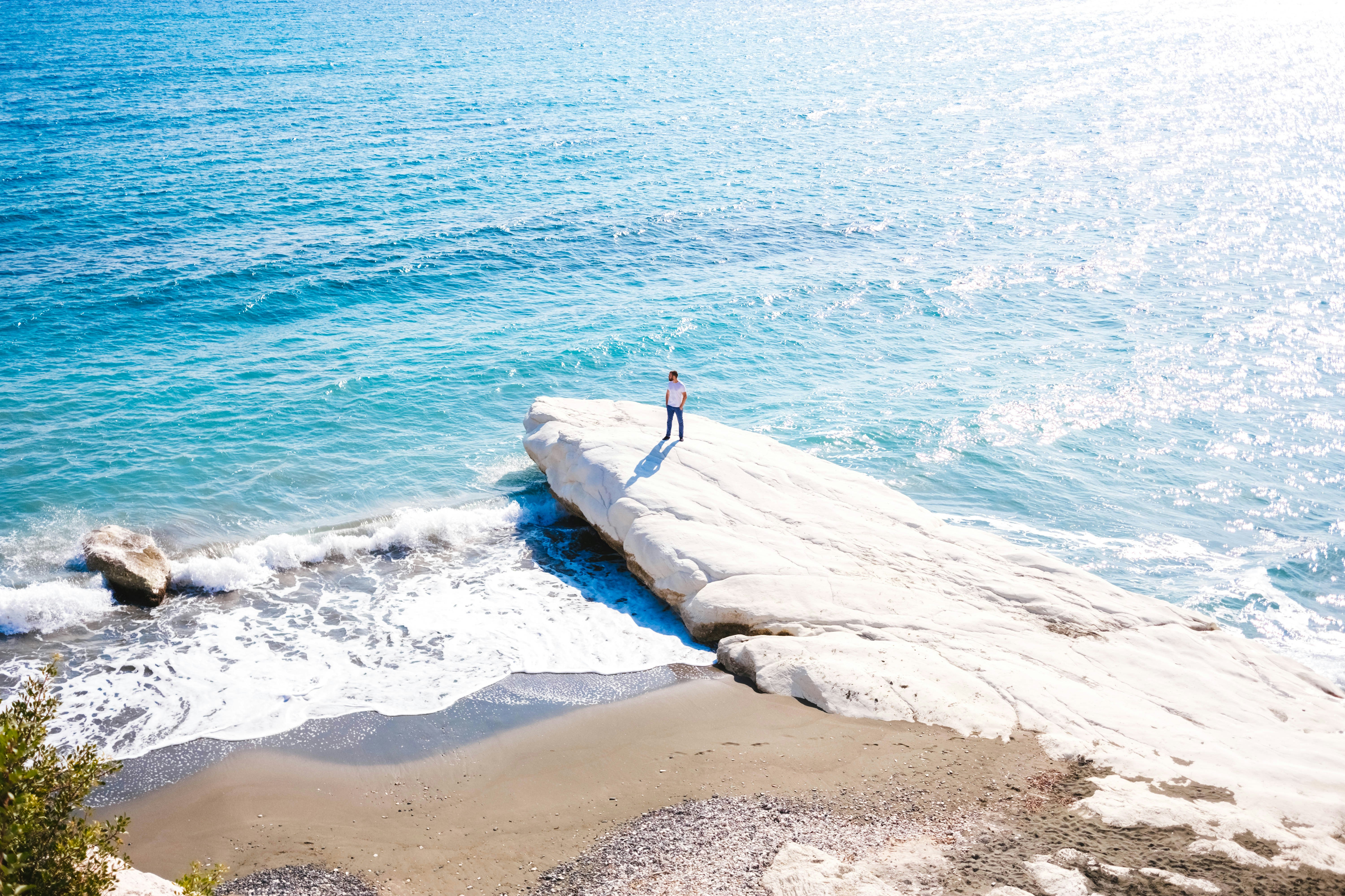 Aerial view of stone beside body of water photo – Free Sea Image on ...