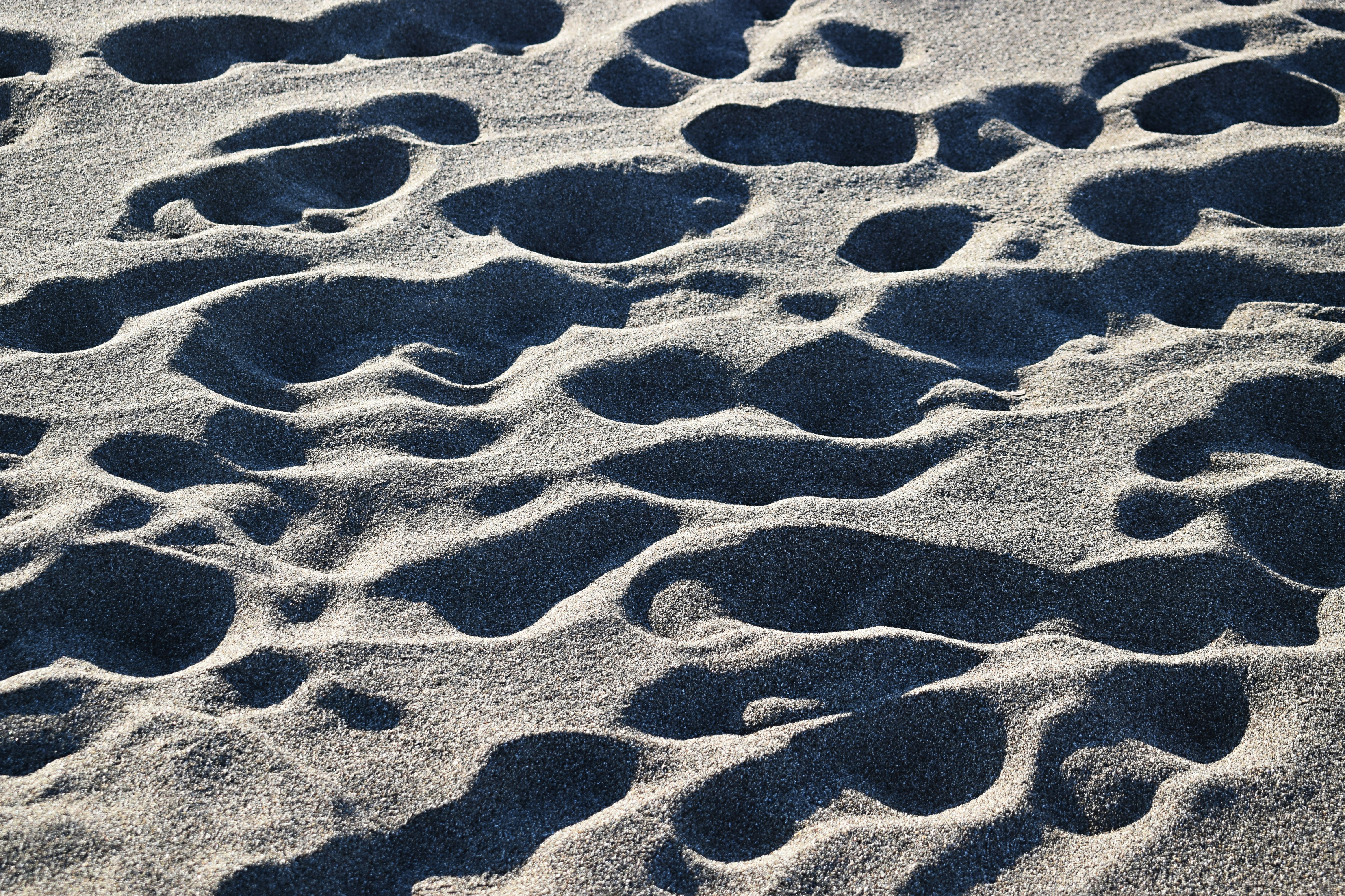 Foot prints on sand during daytime photo – Free Pattern Image on Unsplash