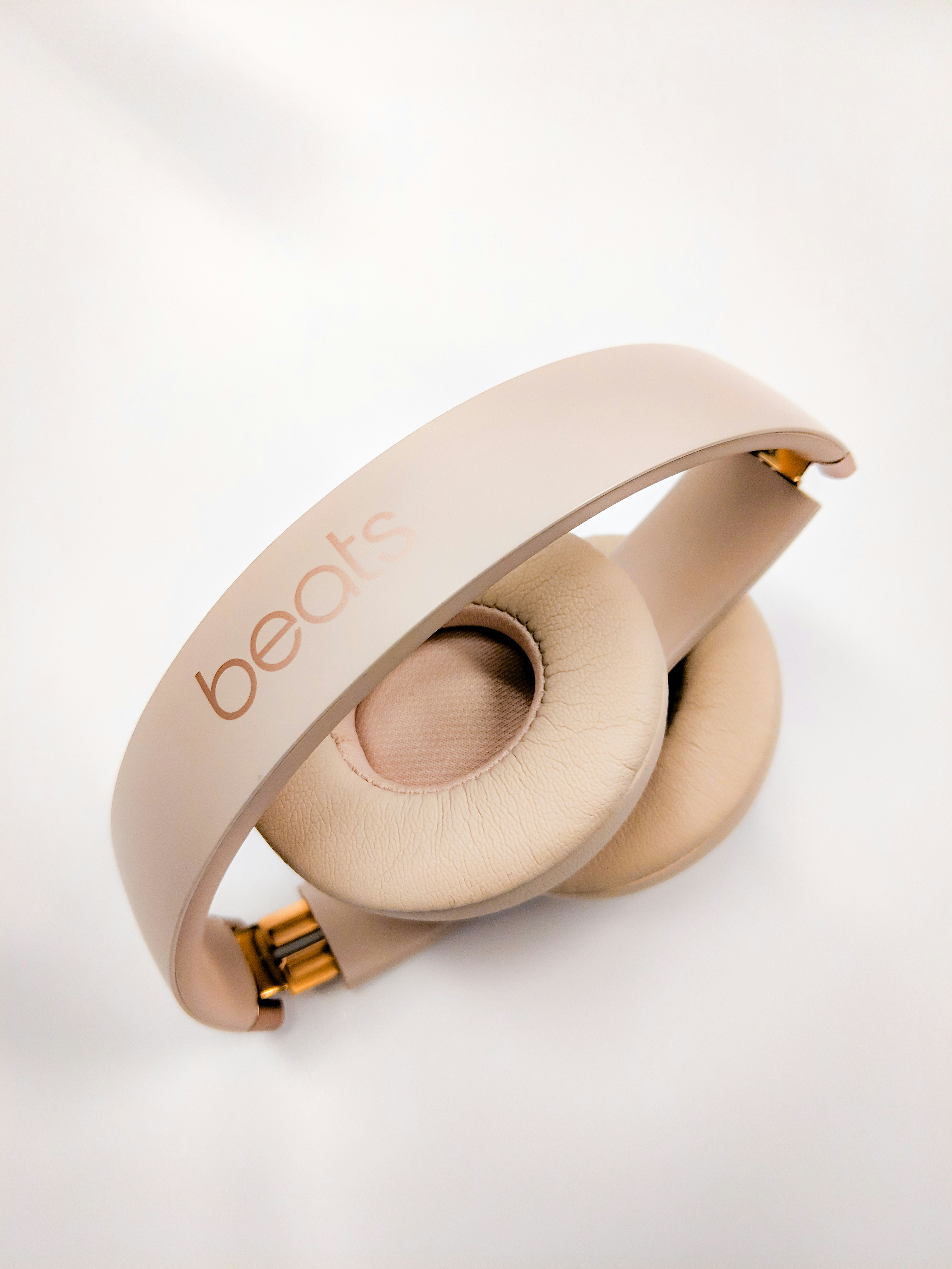 Gold Beats wireless headphones photo – Free Brown Image on Unsplash