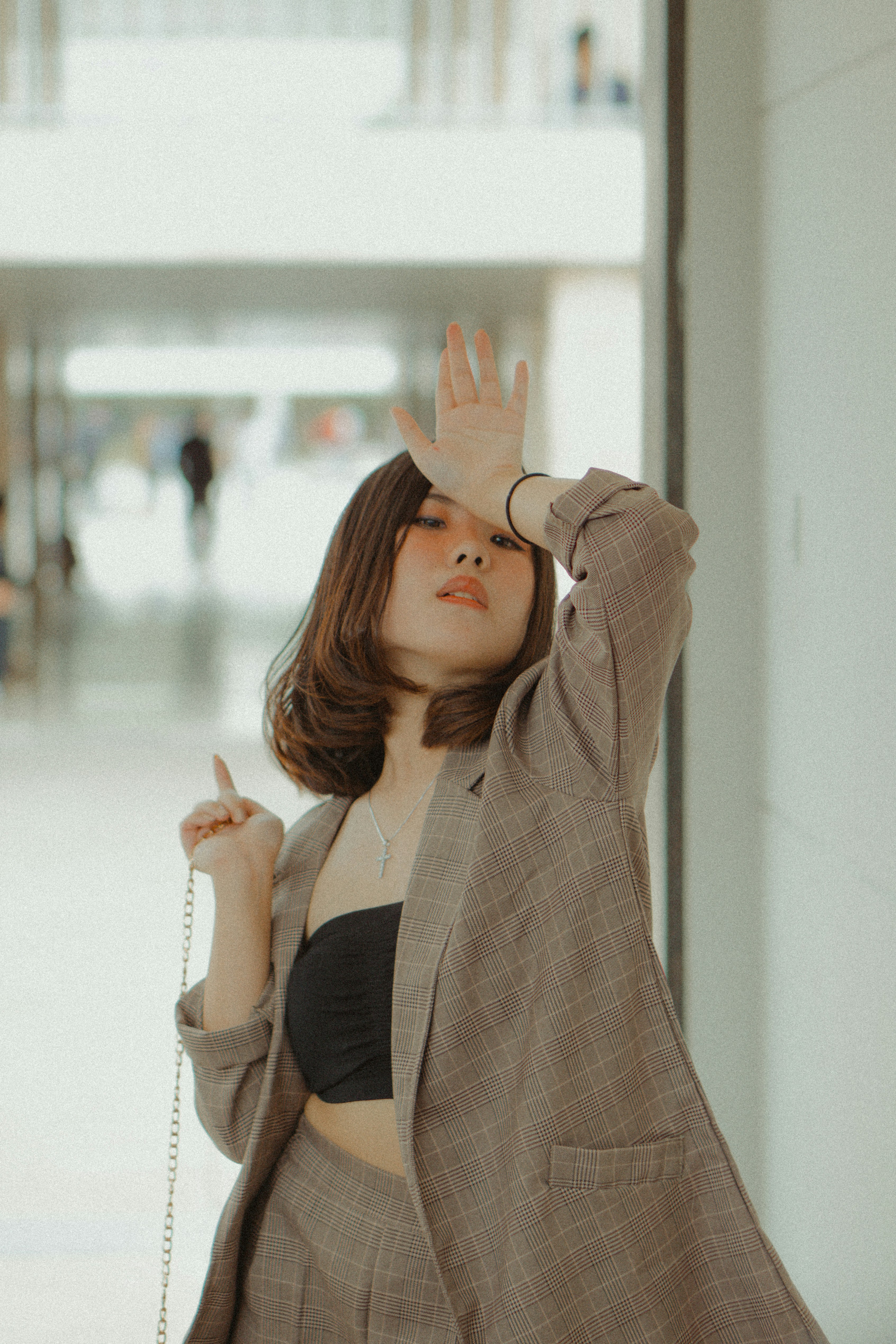 Woman placing left hand on forehead photo – Free Grey Image on Unsplash