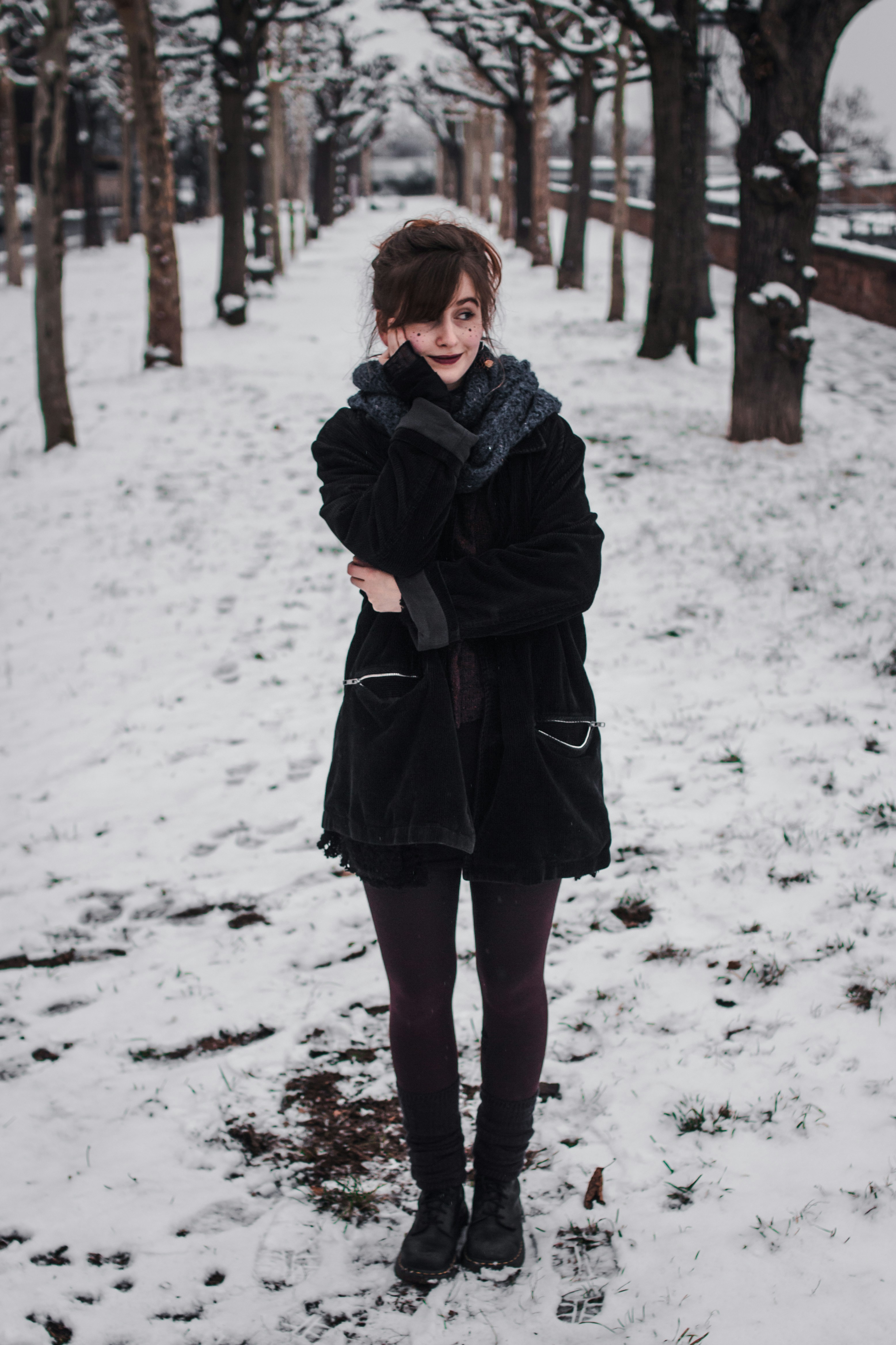 Woman in black coat standing near trees photo – Free Black Image on ...