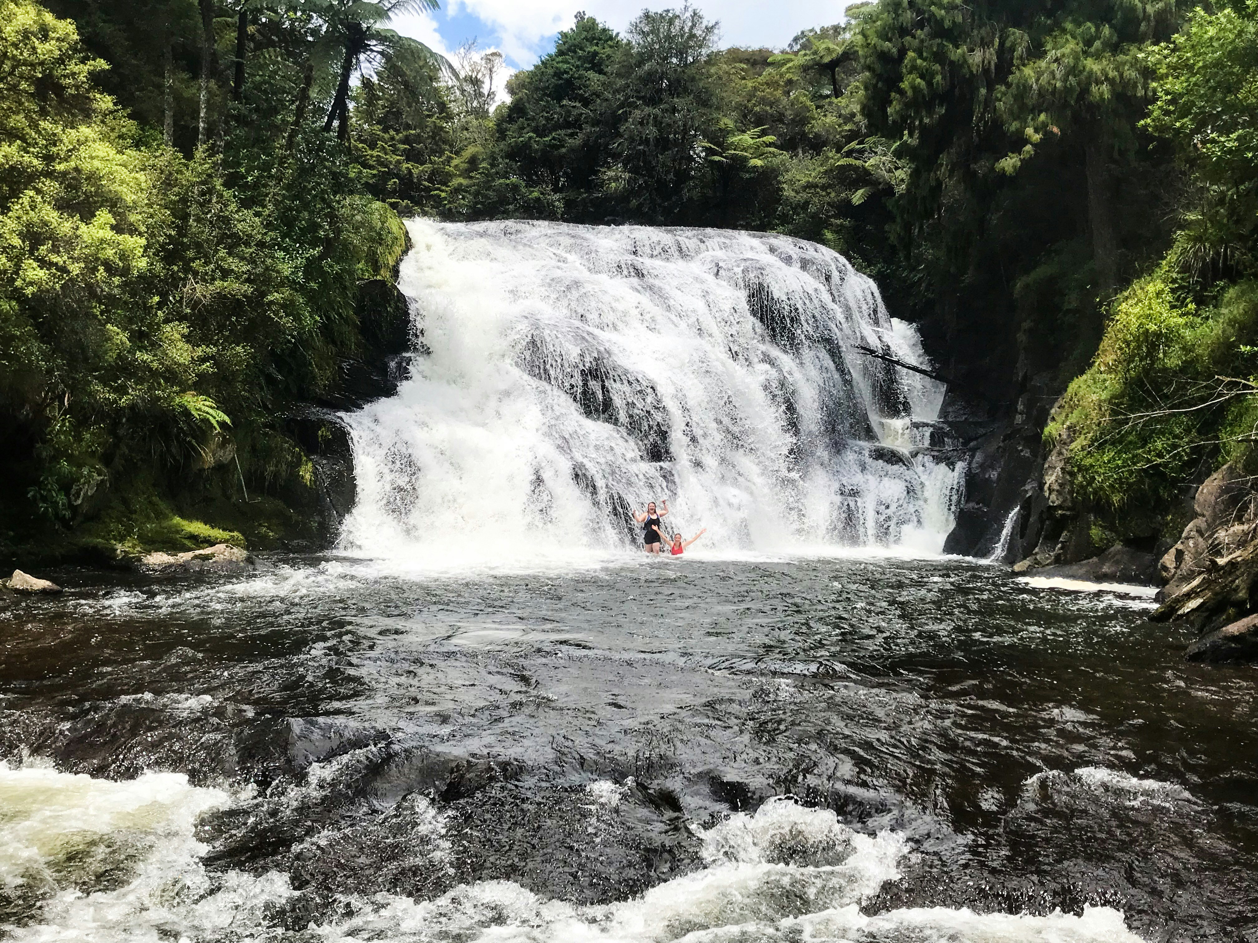 Between Green Walls: a lone kayaker braves the forest waterfall
