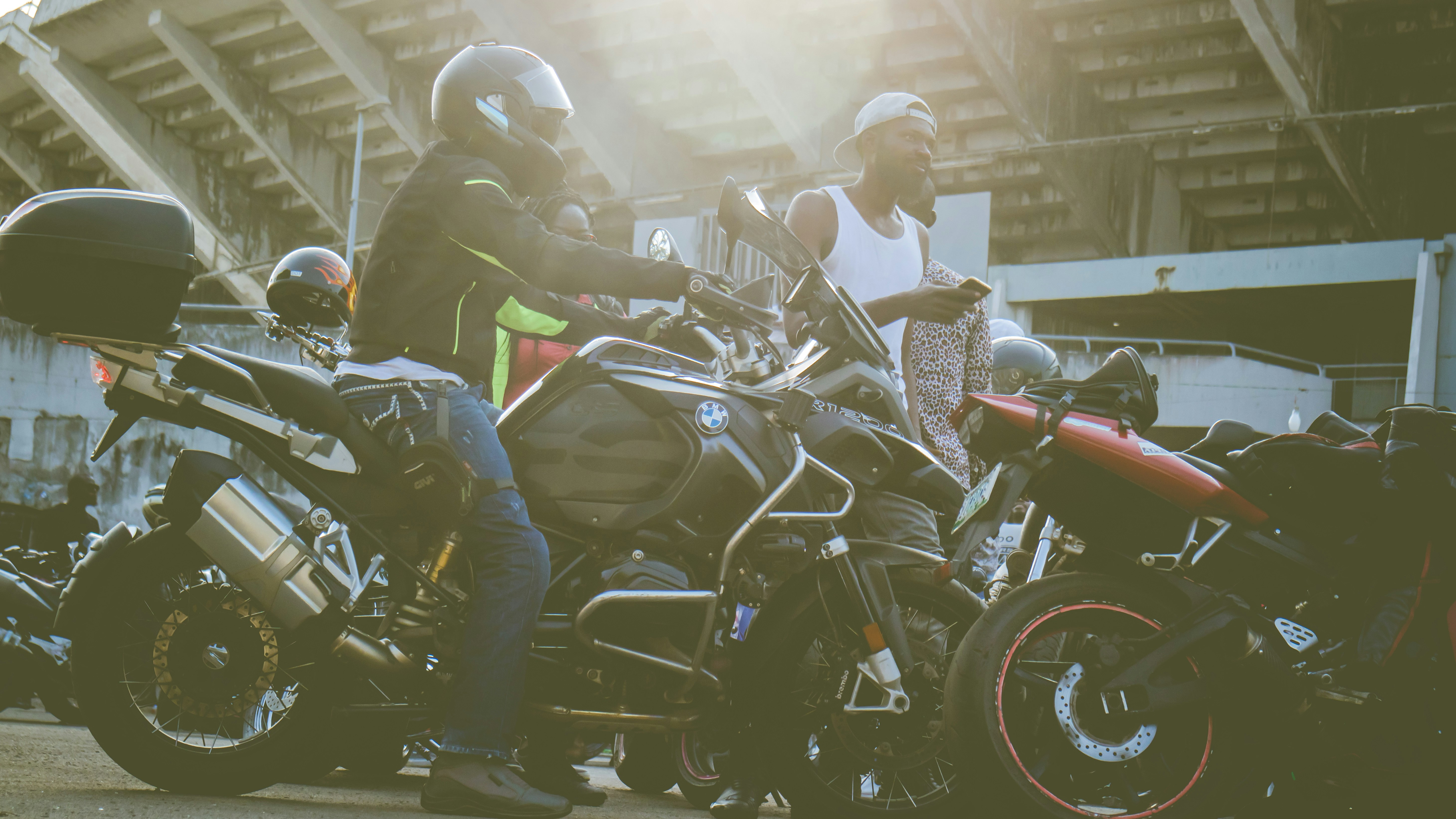 A motorcycle parked next to a wooden fence photo – Free Santa barbara ...