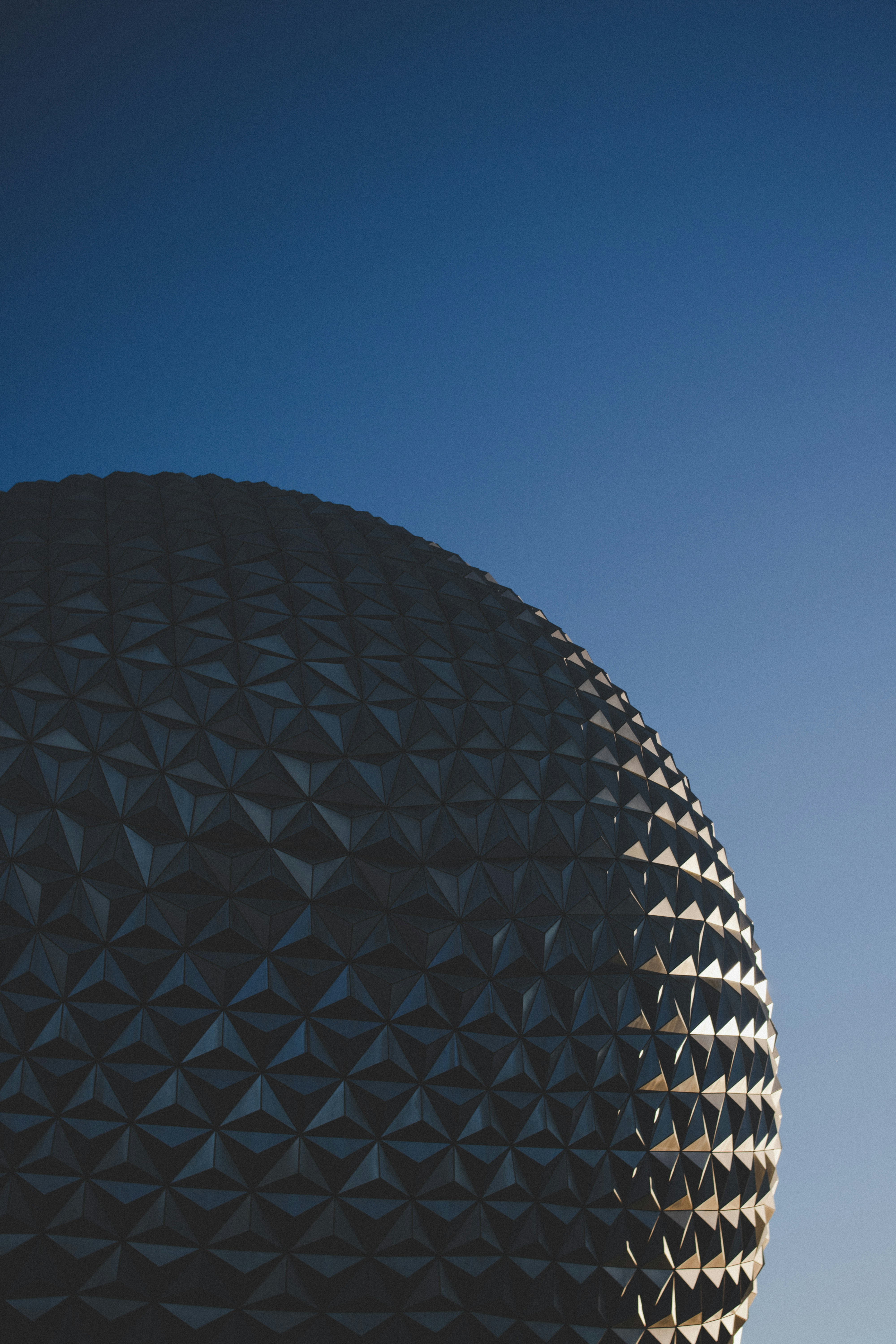 Geometry in Facets: The Geodesic Dome Against a Gradient Sky
