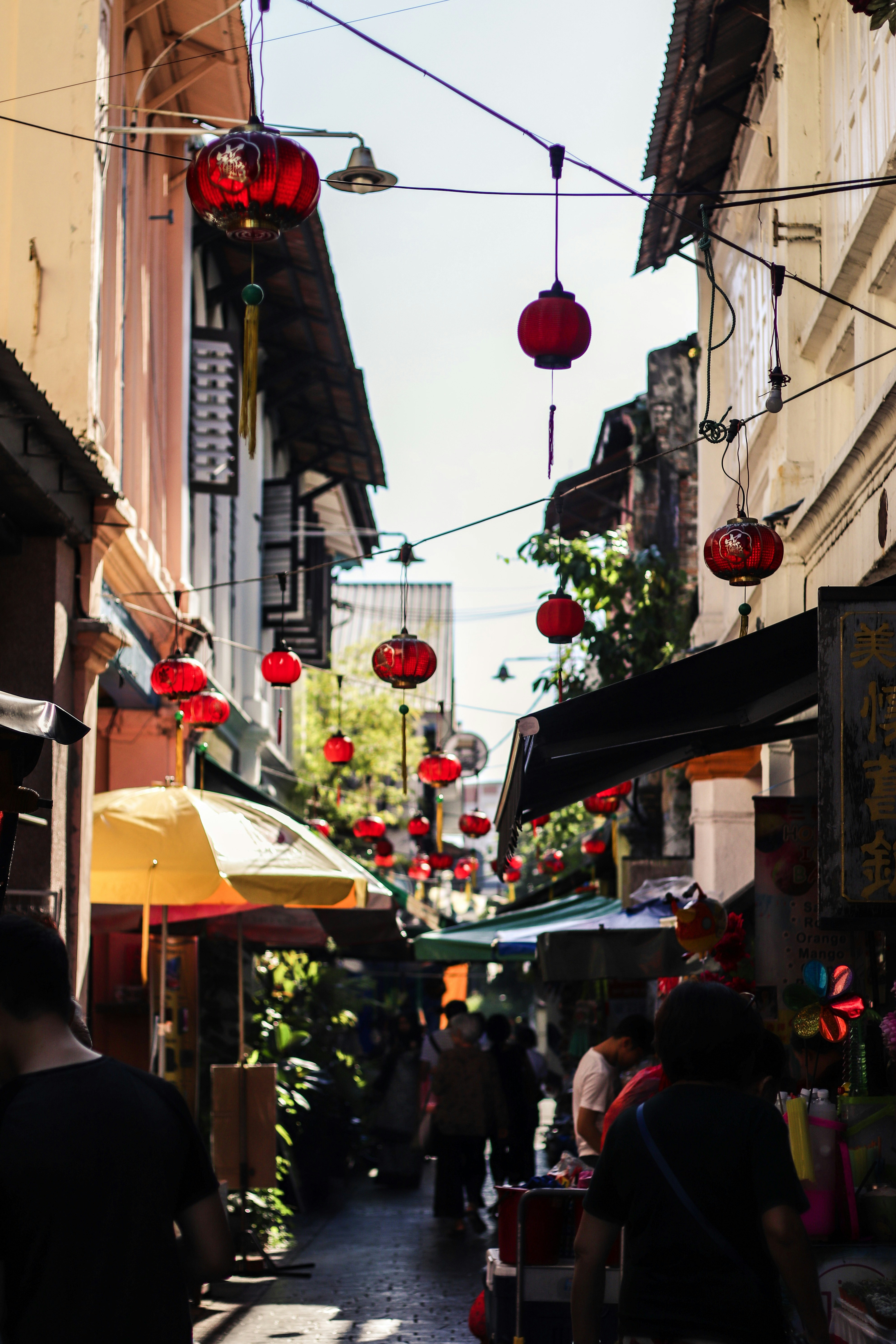 People standing between high-rise buildings photo – Free Building Image ...
