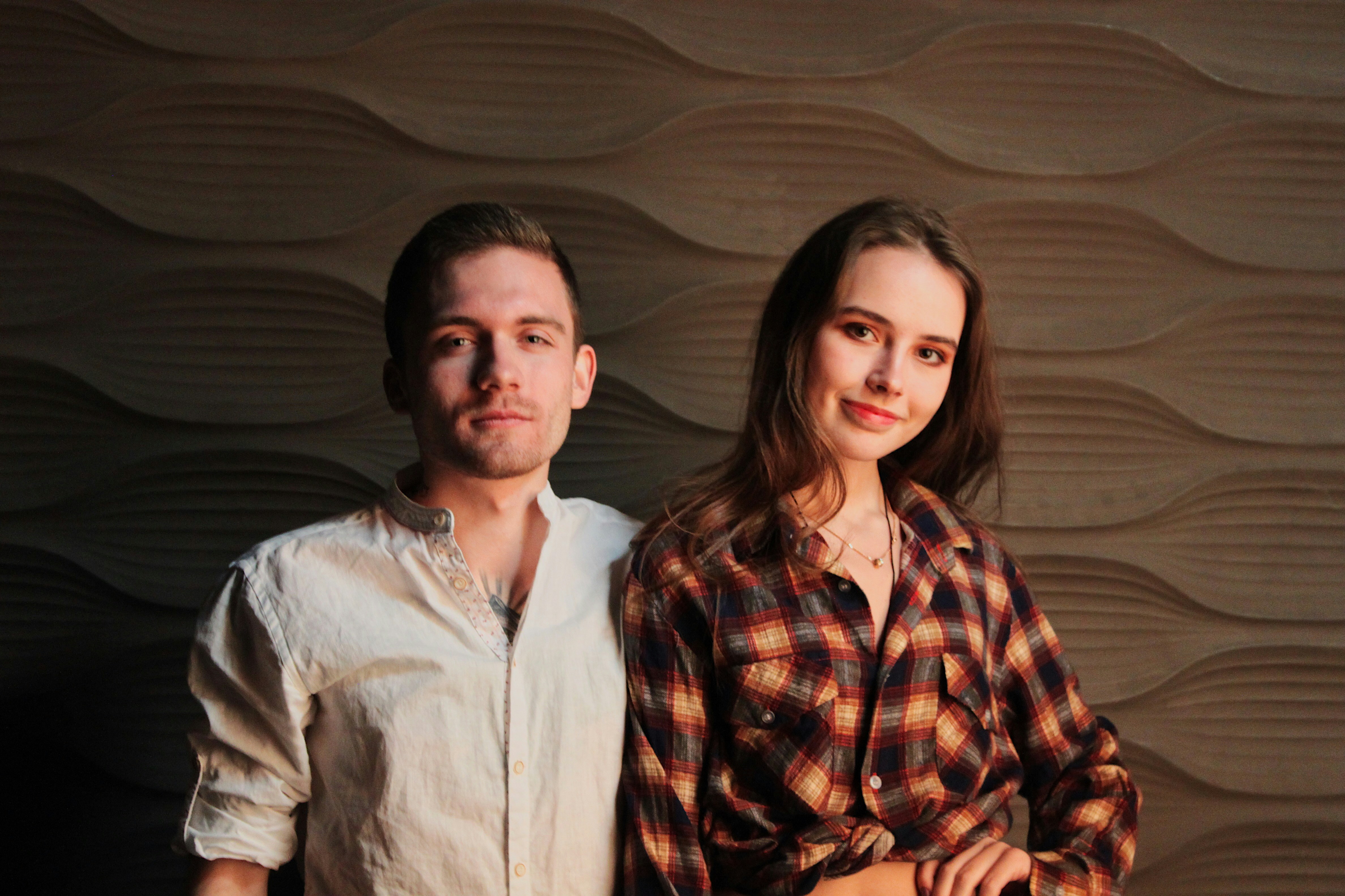 Man and woman standing side by side photo – Free Man Image on Unsplash