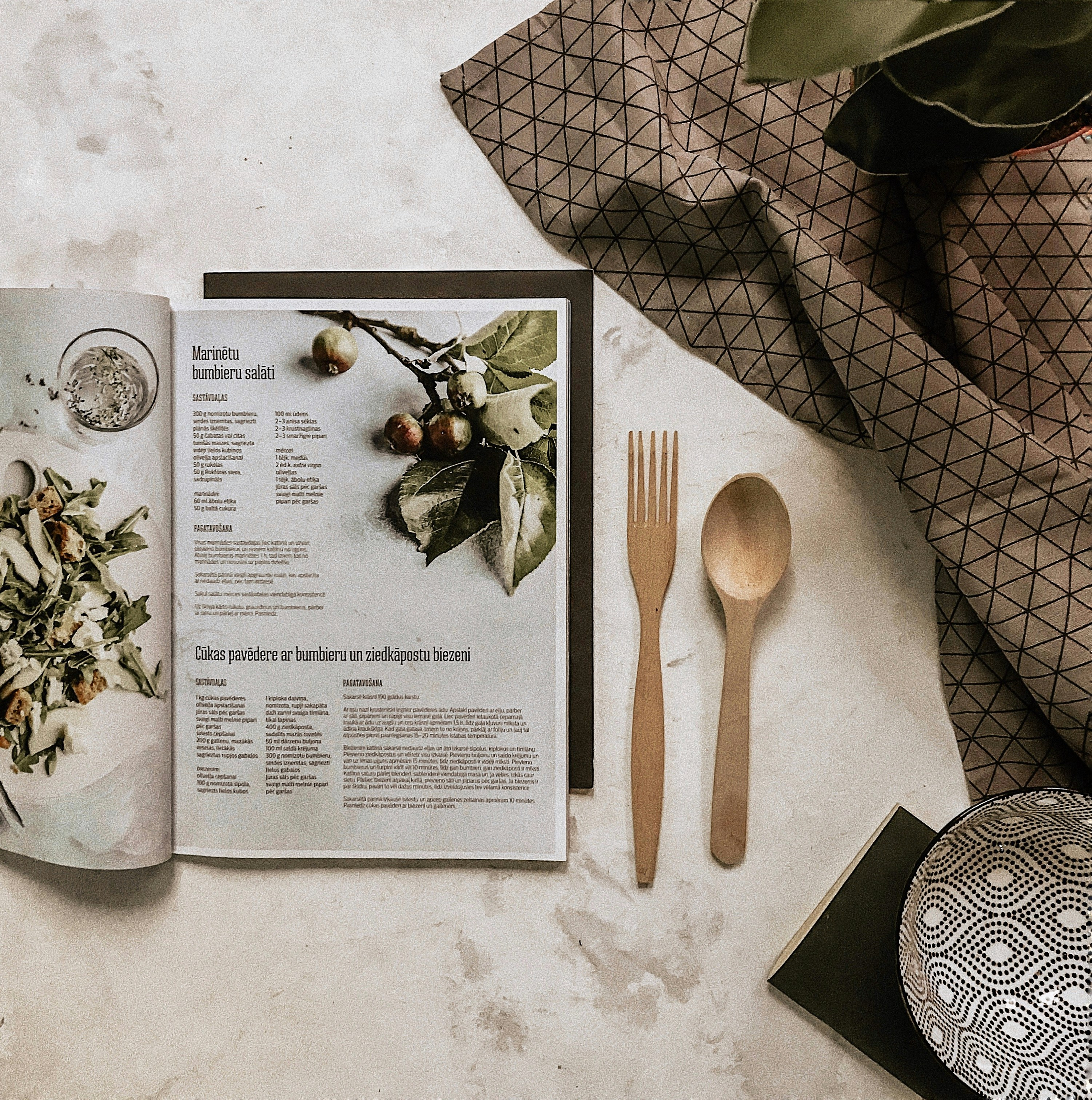 Open cookbook centerpiece: a quiet culinary still life