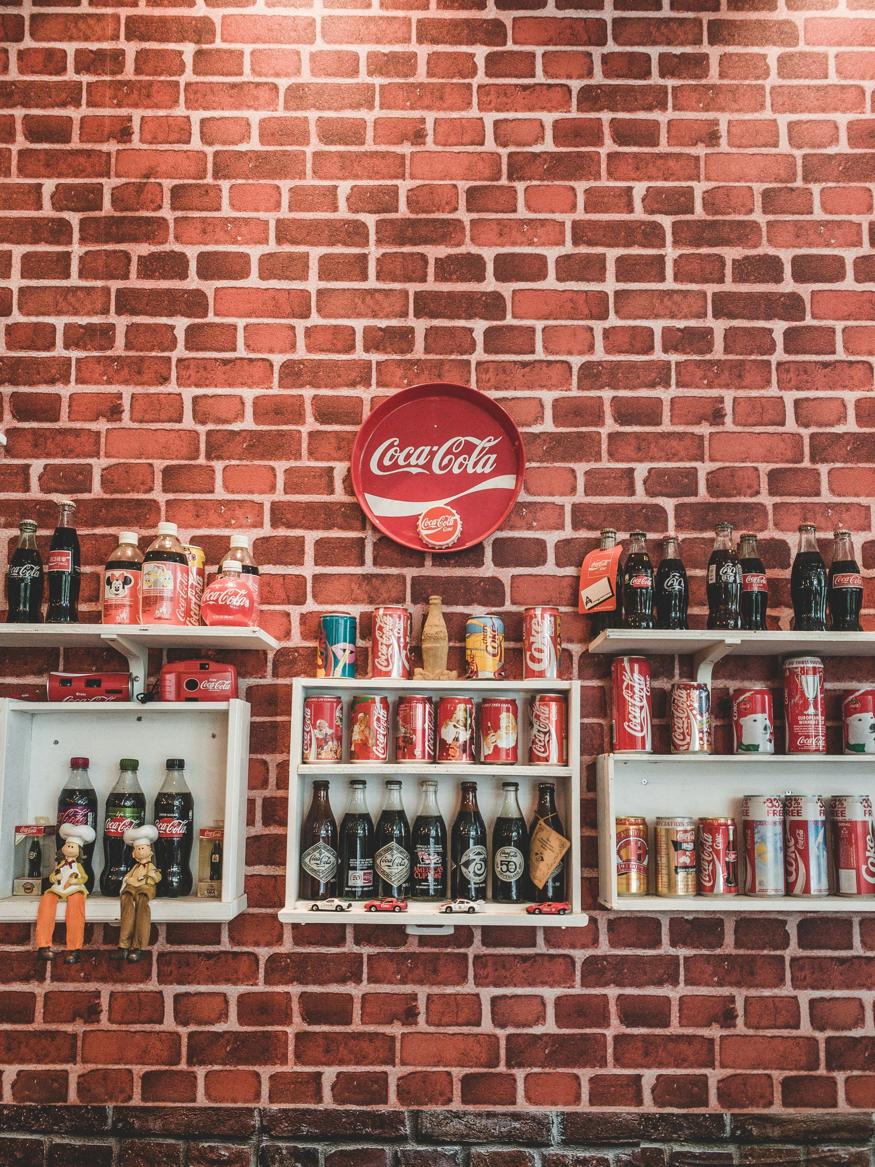 Assorted design of Coca-Cola soda lot on display photo – Free Brick ...