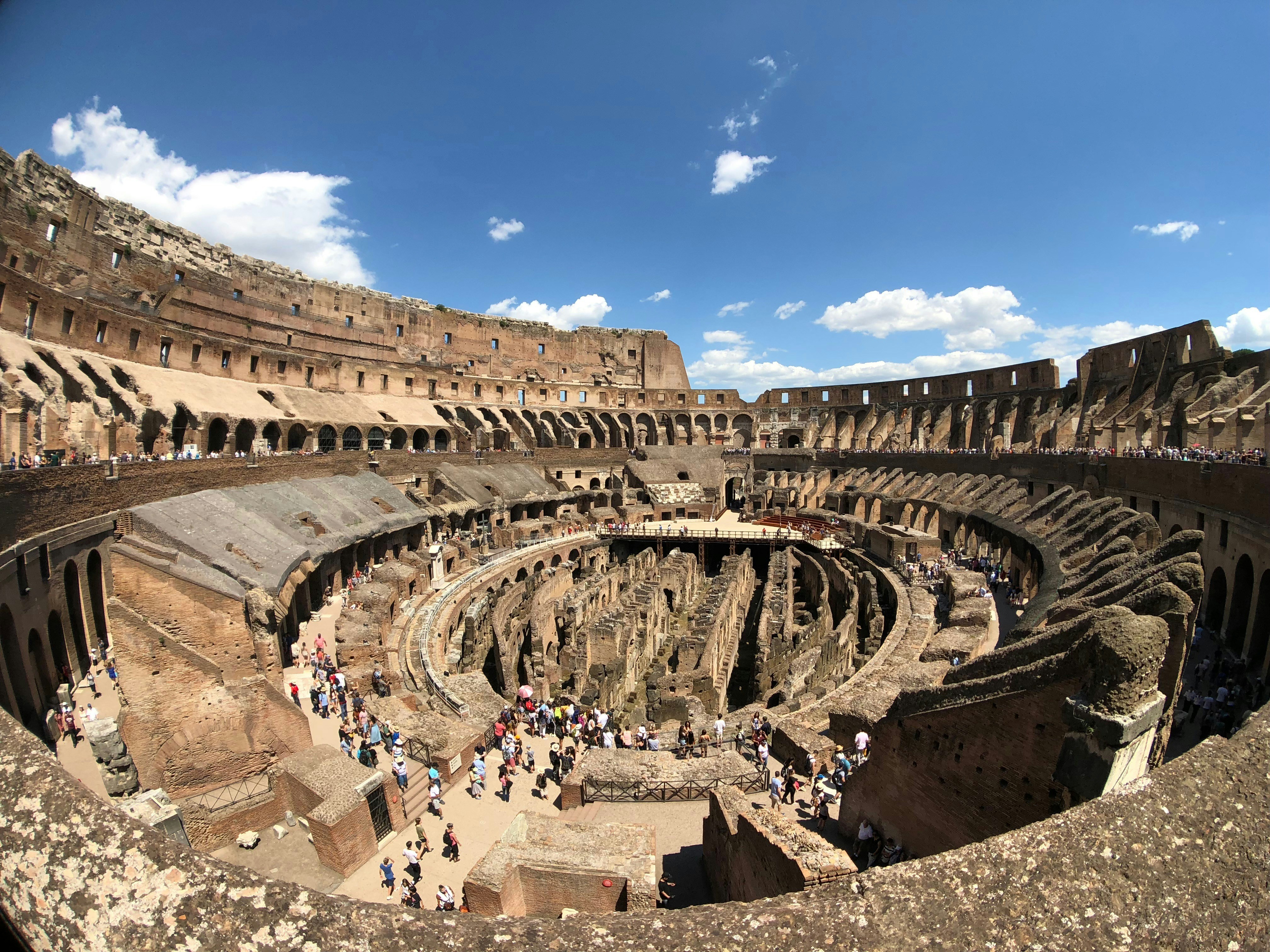 Crowd of people inside stadium photo – Free Piazza del colosseo Image ...