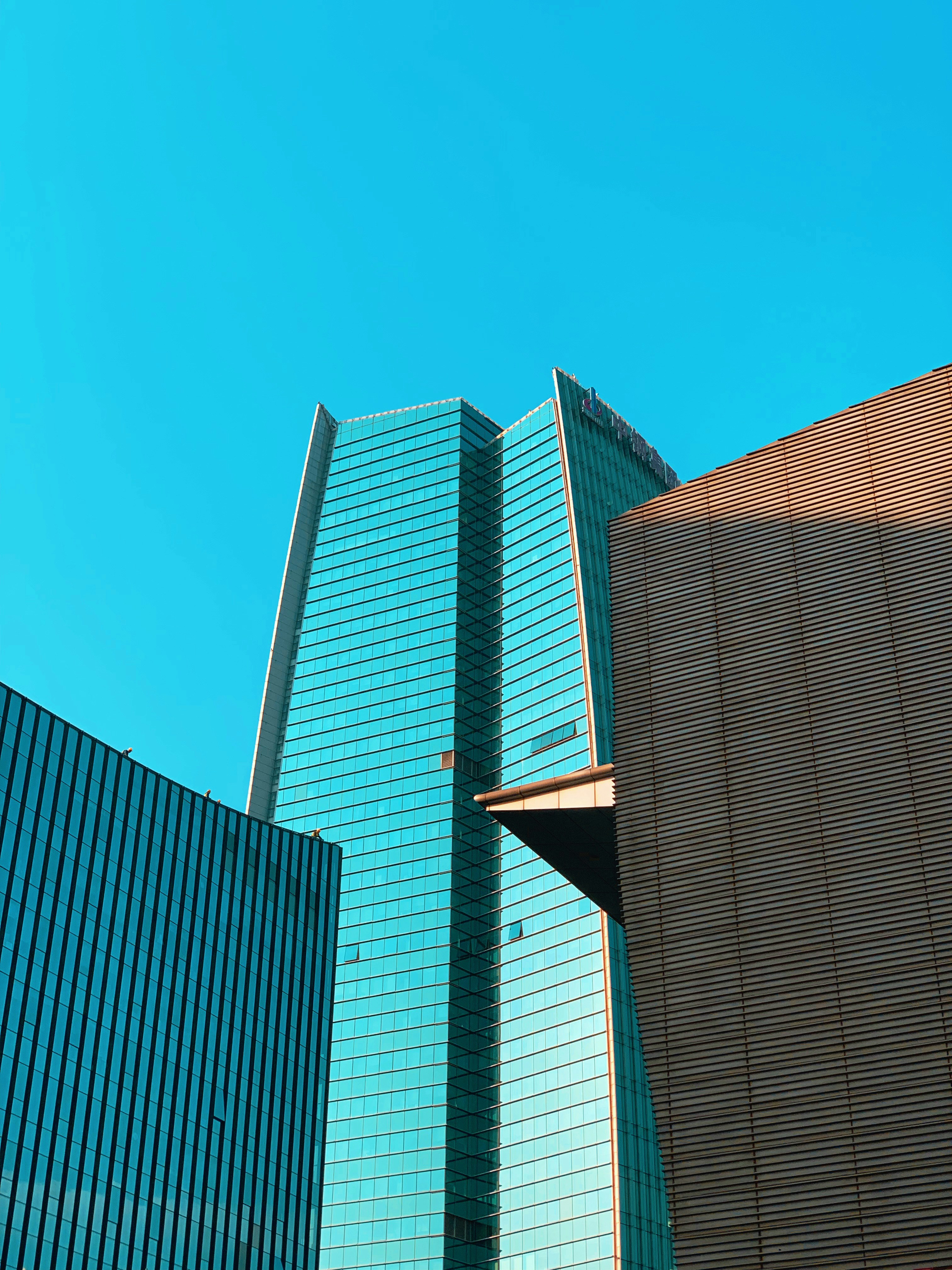 Blue high rise buildings photo – Free Tian chuang ke ji da sha Image on ...