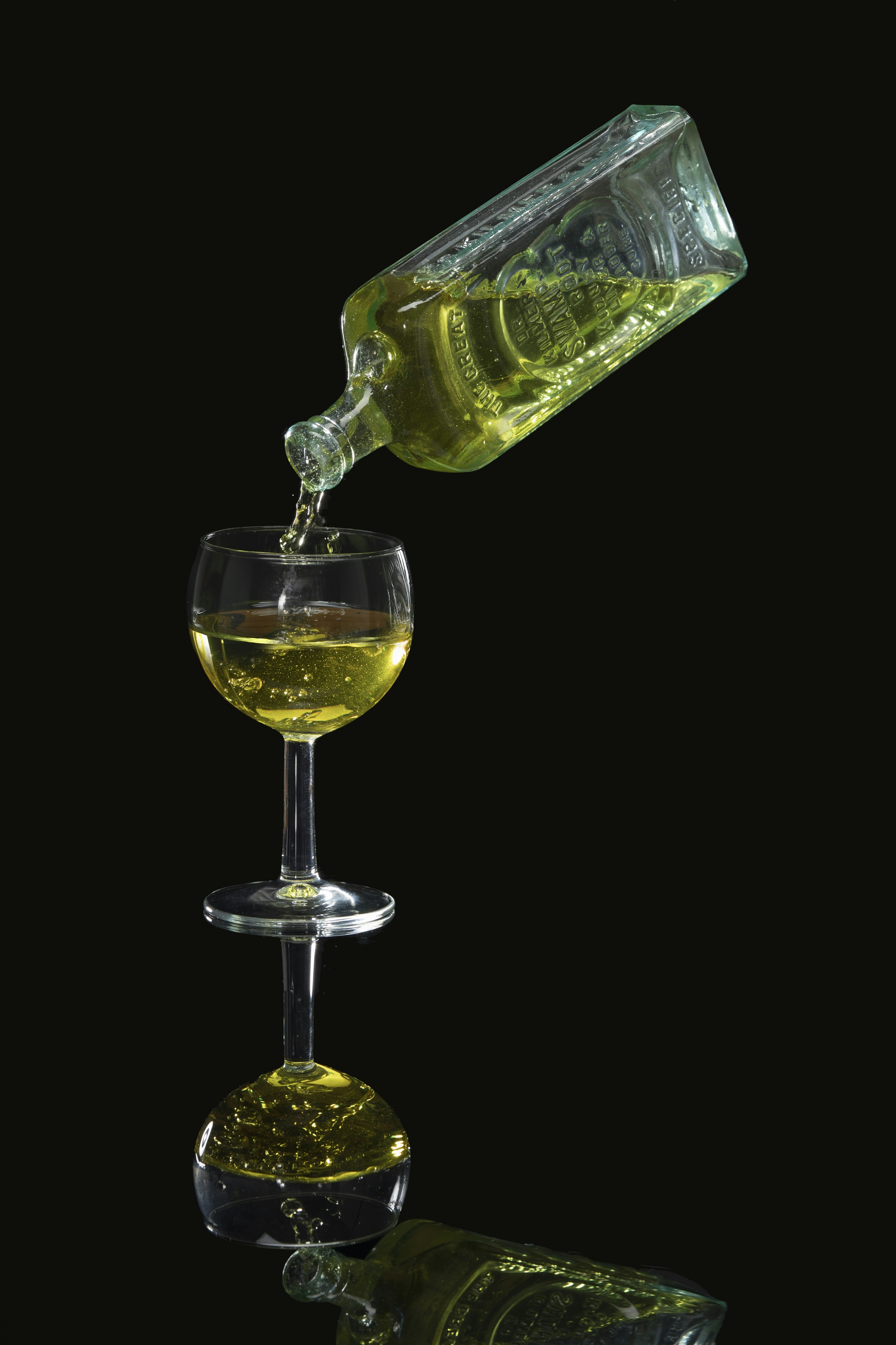 Wine glass and glass bottle photo – Free Green Image on Unsplash
