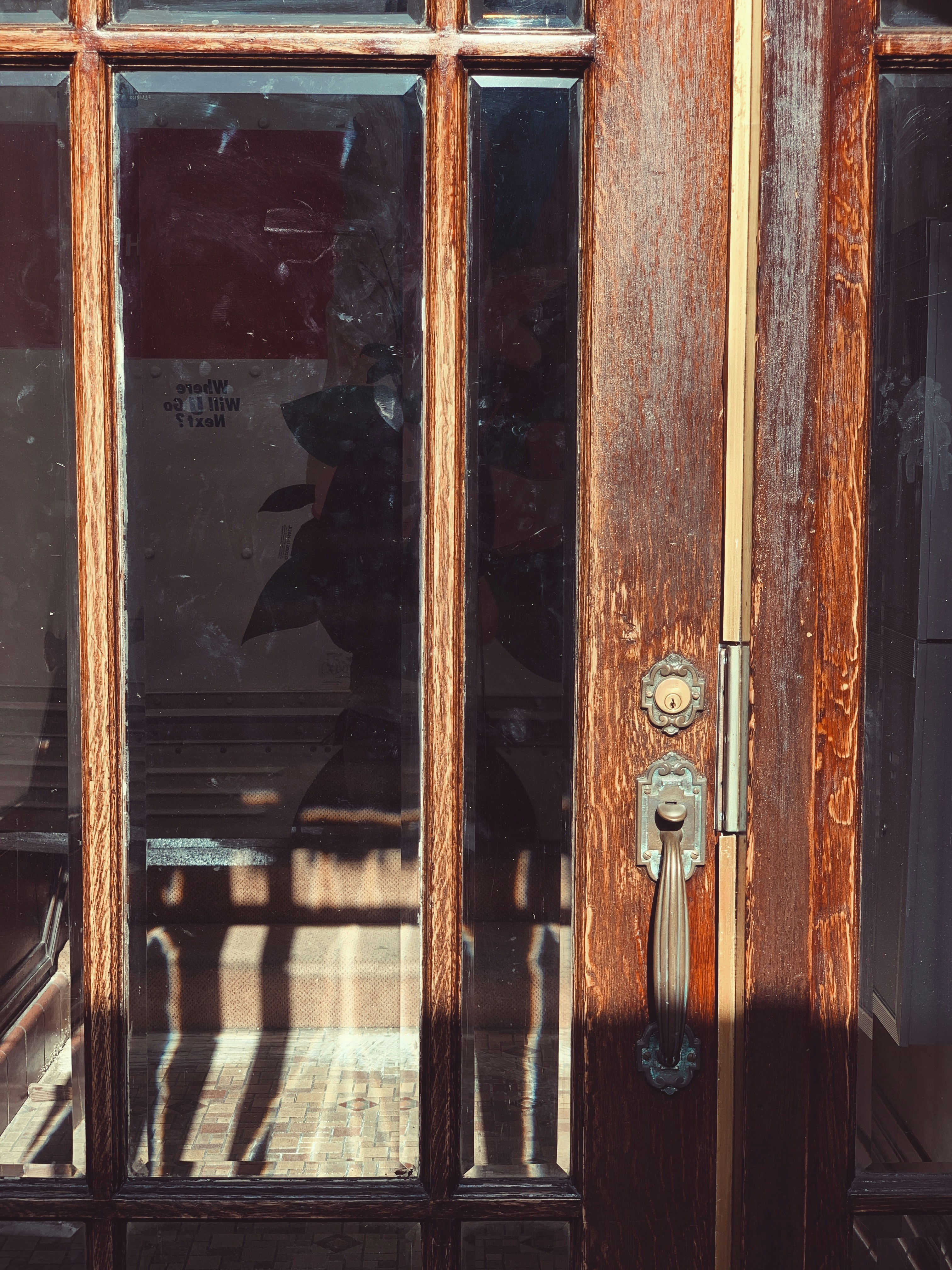 brown wooden panel door