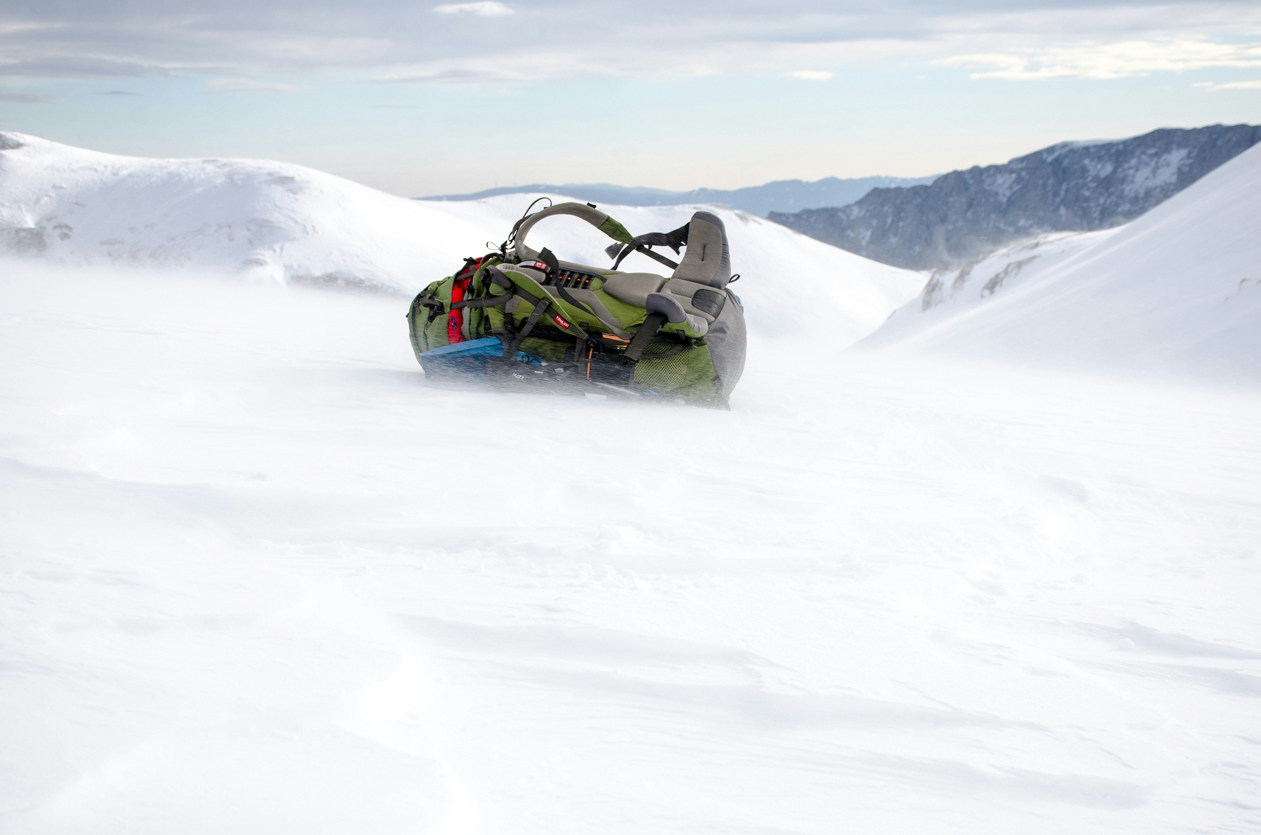 Duffel bag on snow photo – Free Grey Image on Unsplash
