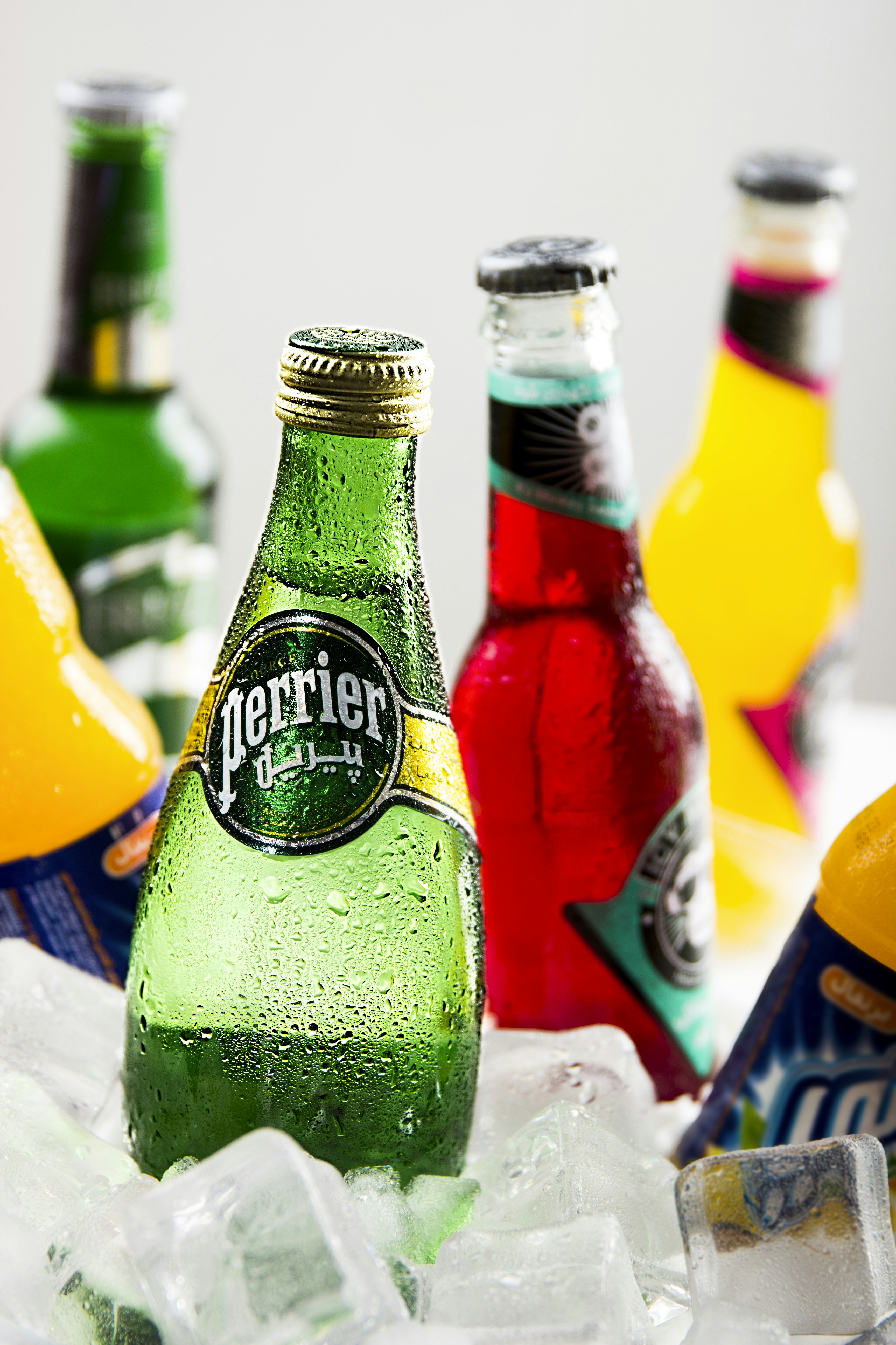 Several Perrier glass drink bottles photo – Free Water Image on Unsplash