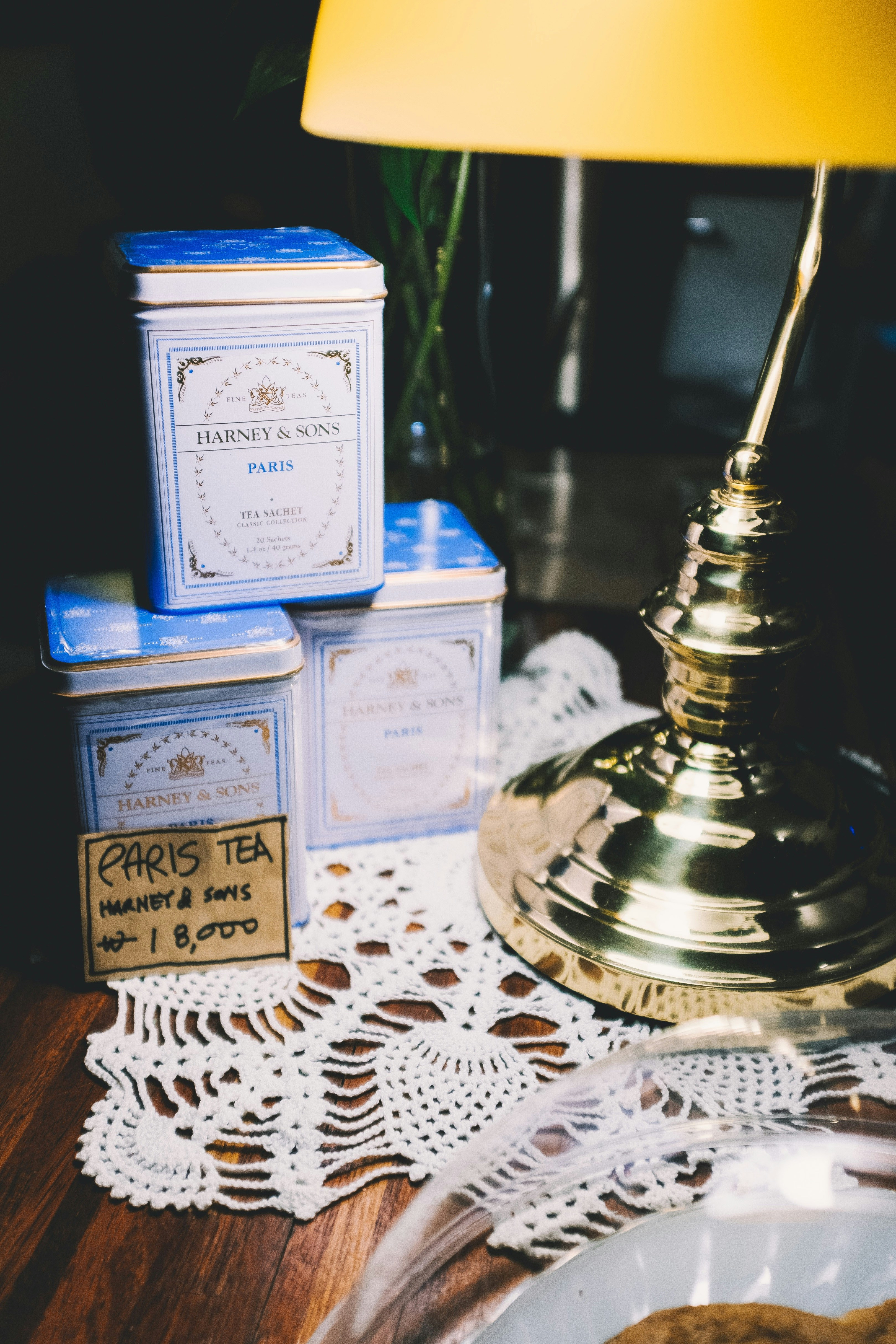 Tea Tins and Brass Glow: A Cozy Still Life
