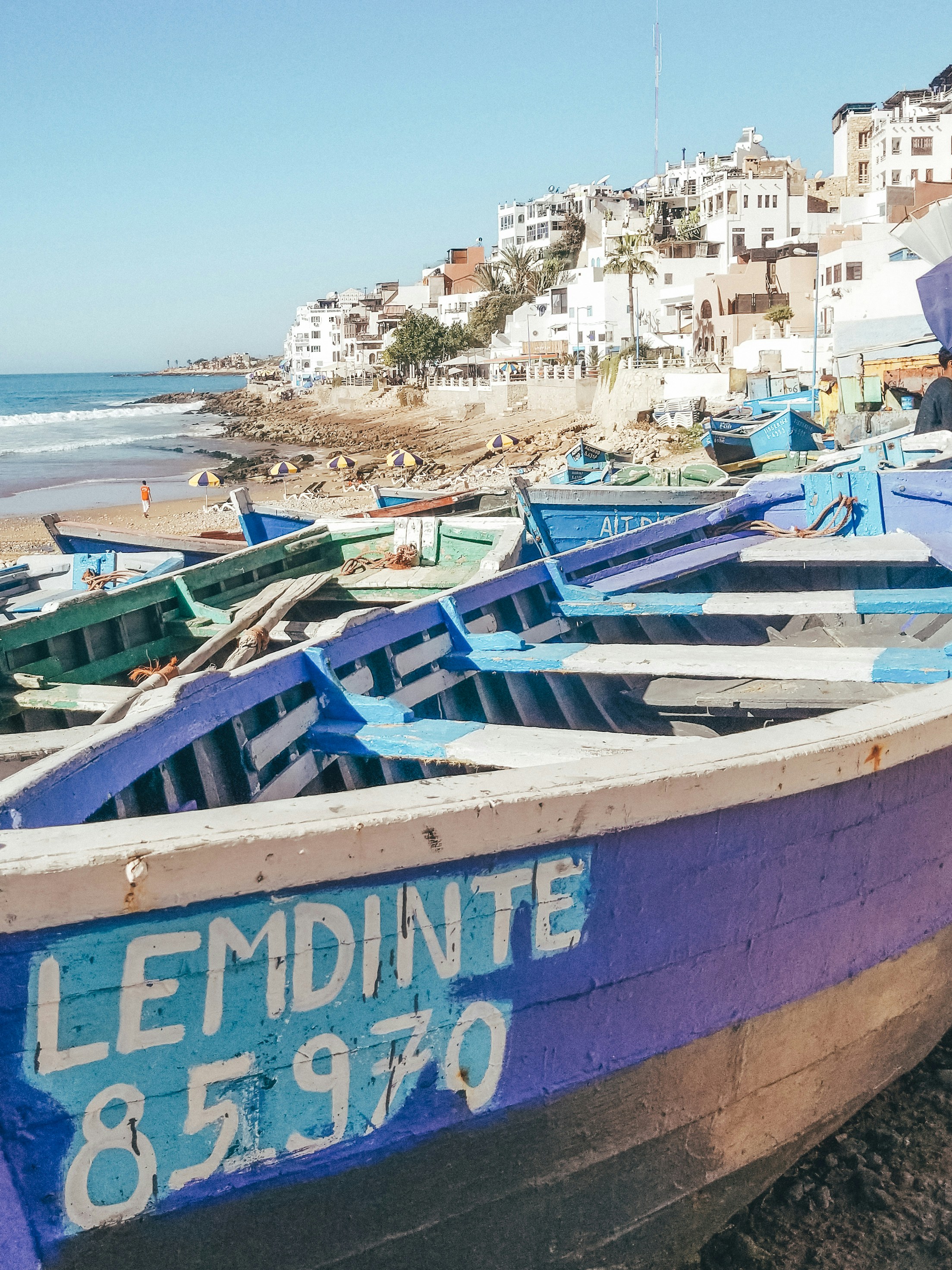 Blue and white boat on sea shore during daytime photo – Free Boat Image ...
