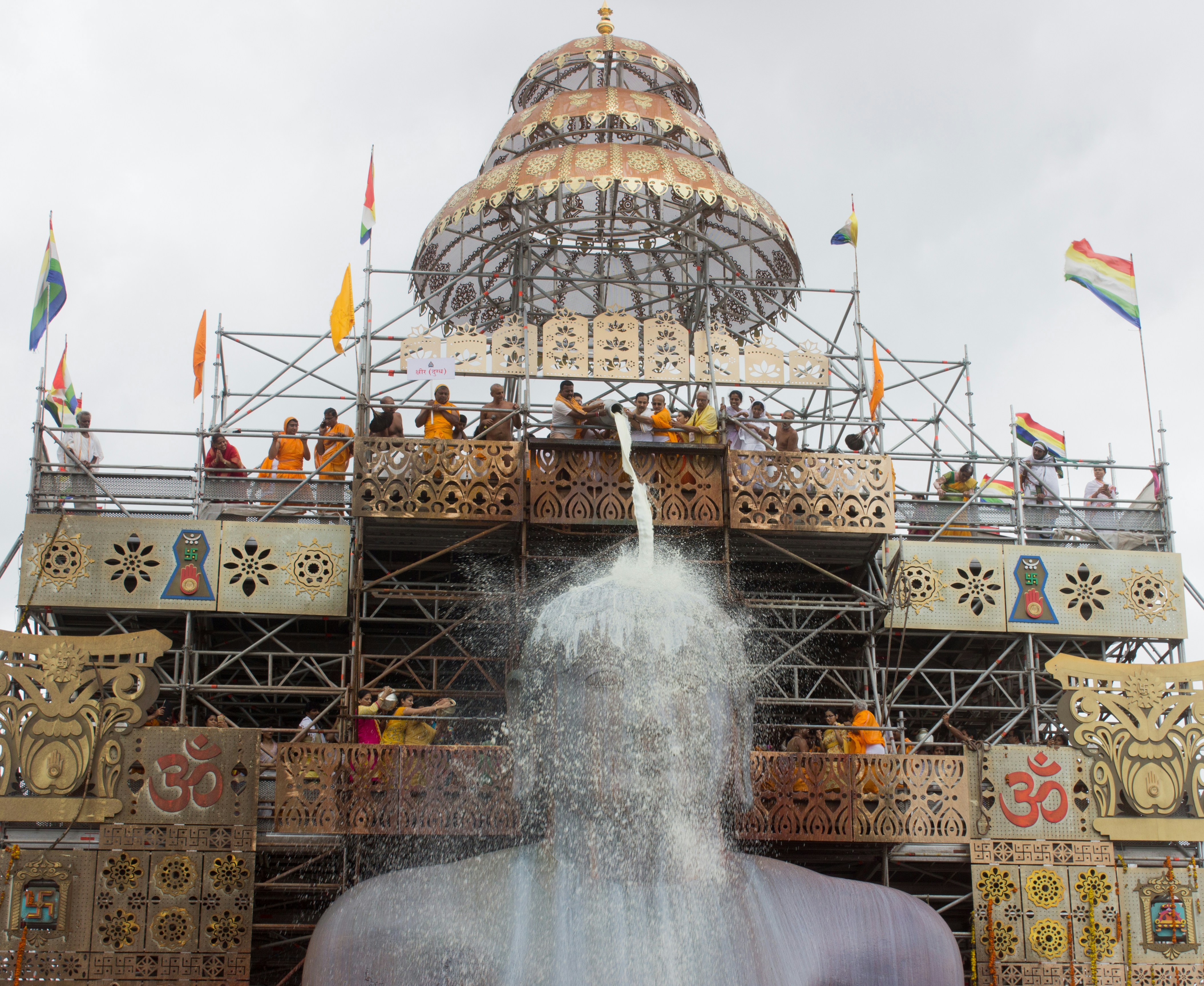 People pouring water on statue photo – Free Current events Image on ...