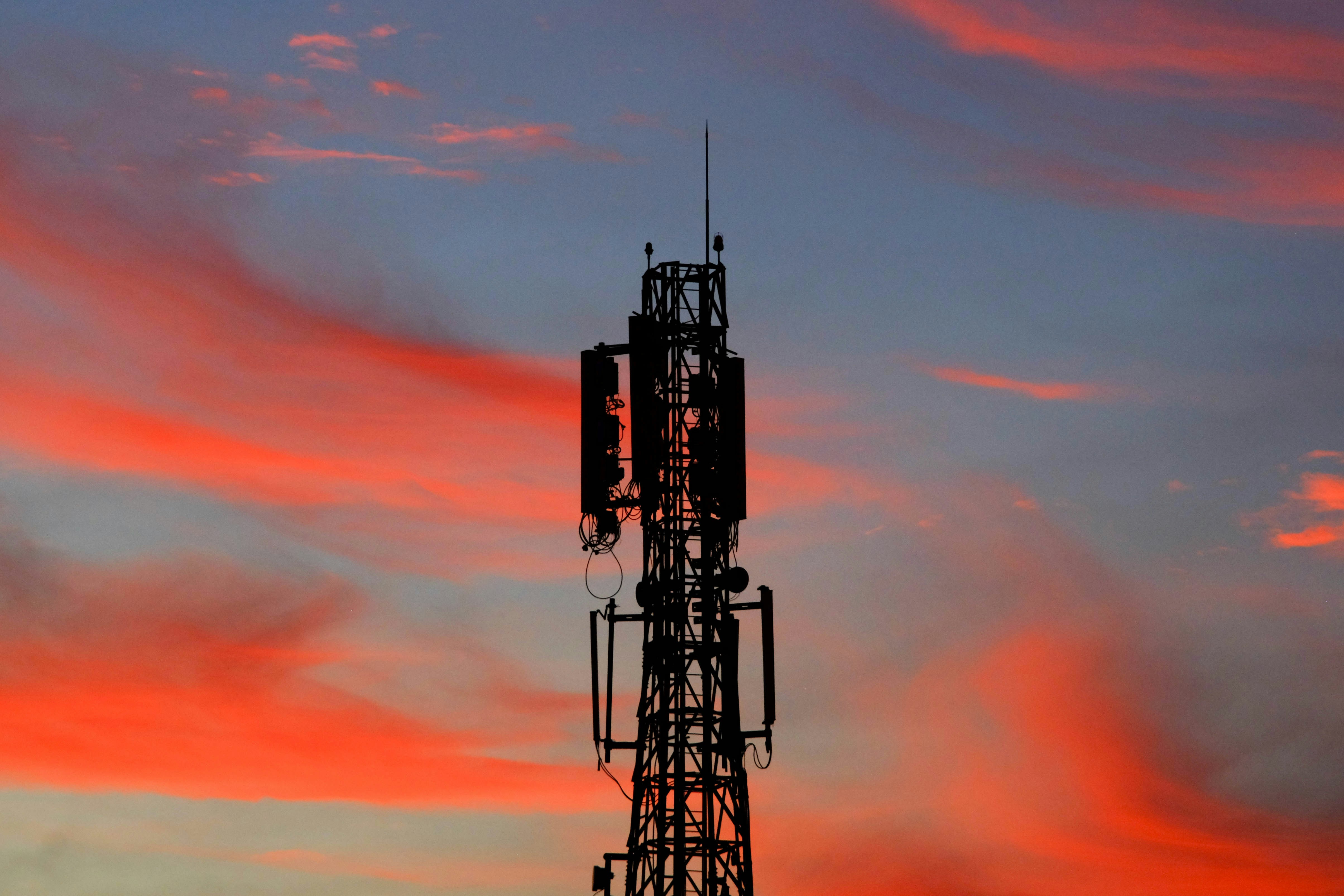 Twilight Signals: A Tower Against Painted Skies