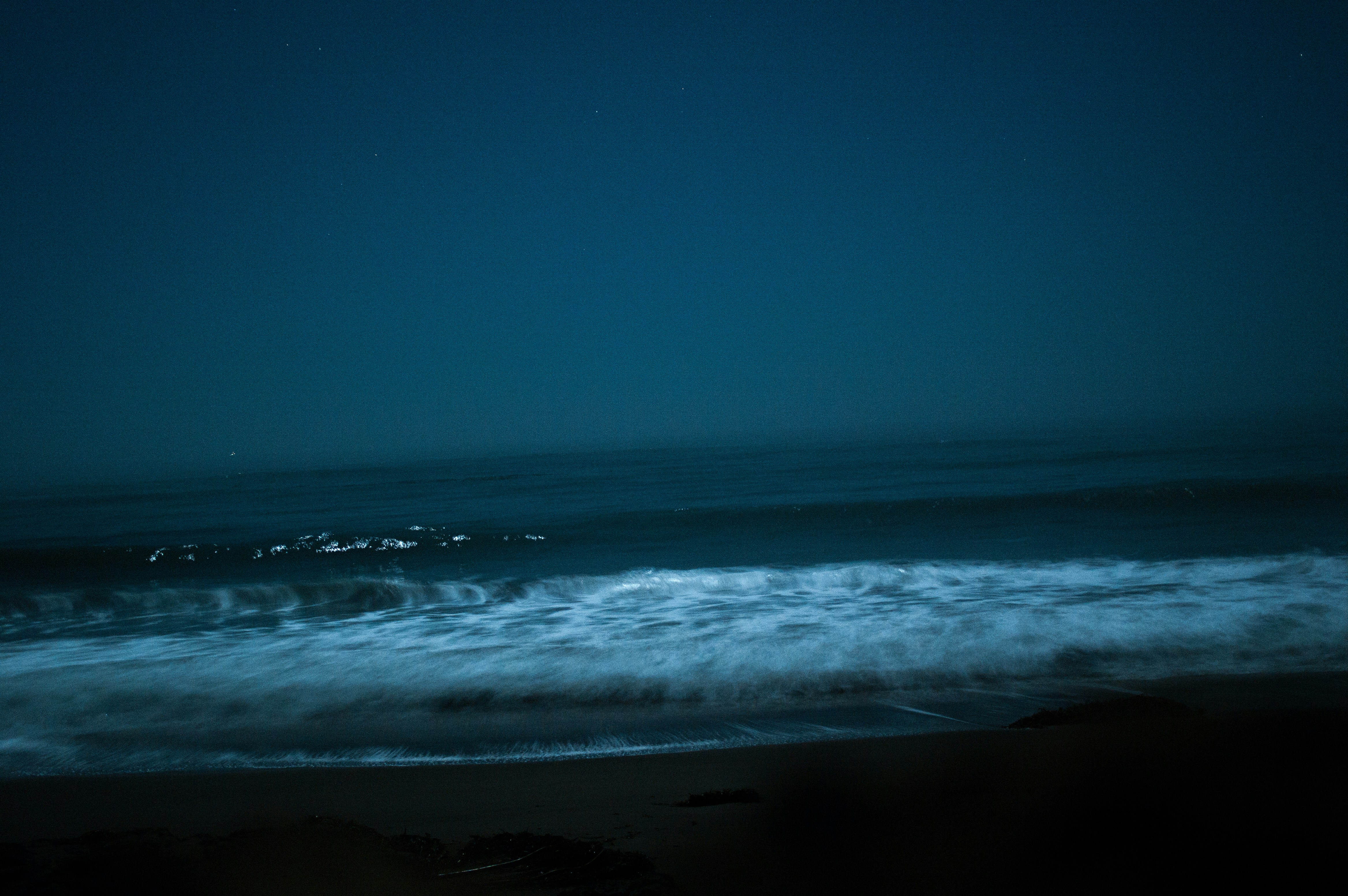 Sea waves during nighttime photo – Free Grey Image on Unsplash