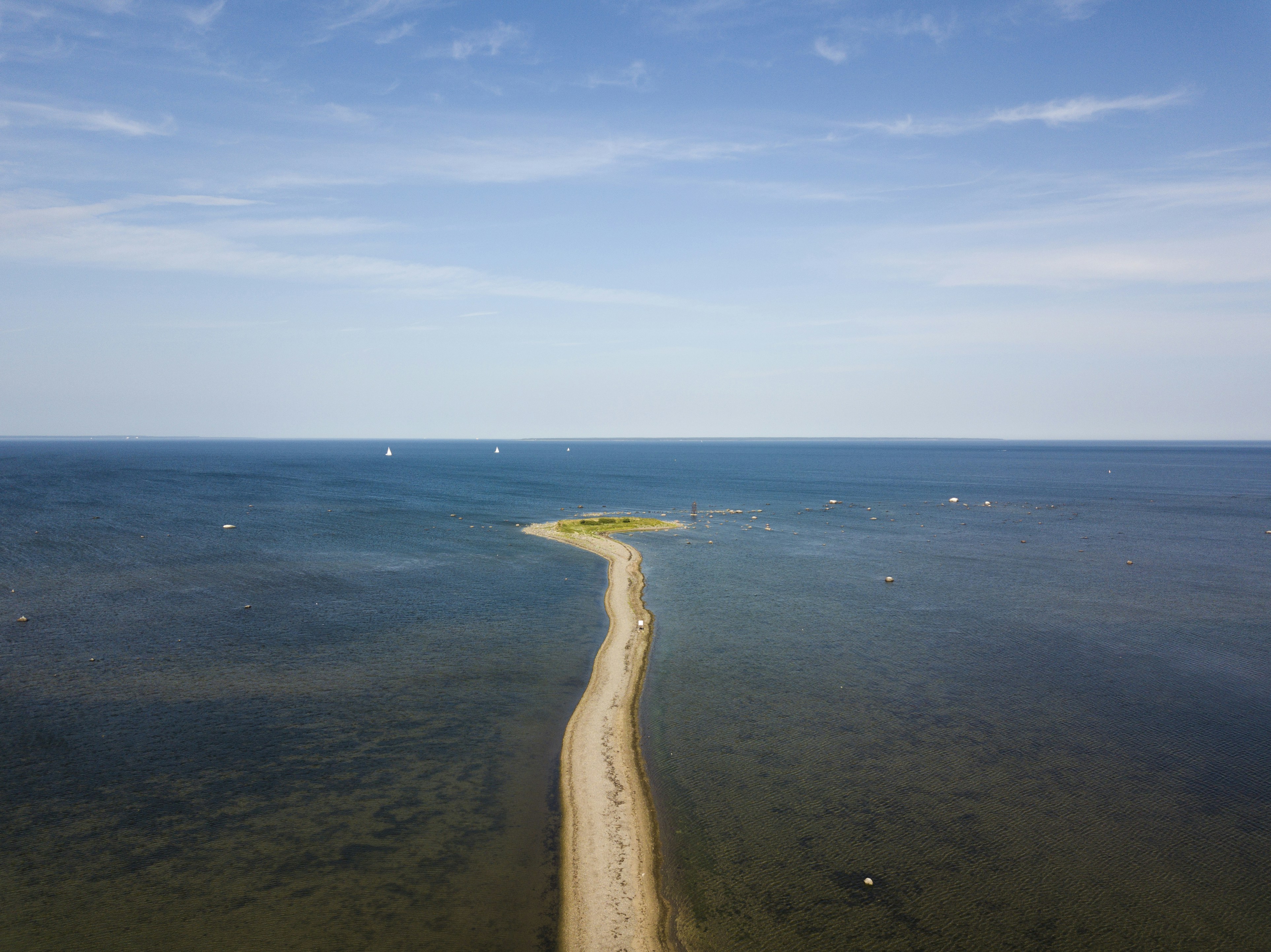 Pathway between body of water during daytime photo – Free Blue Image on ...