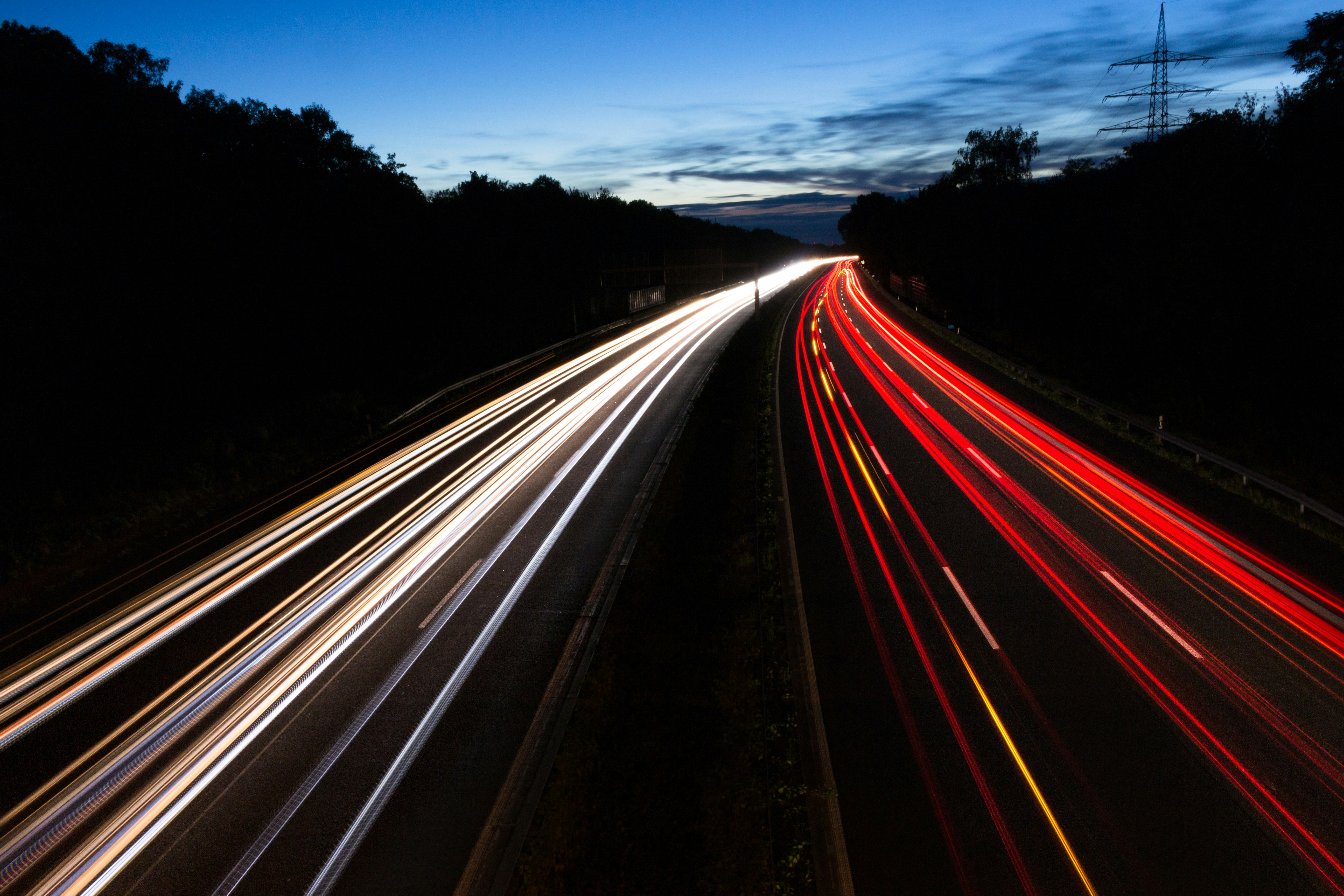Time-lapse photography of vehicles passing by high-way road photo ...