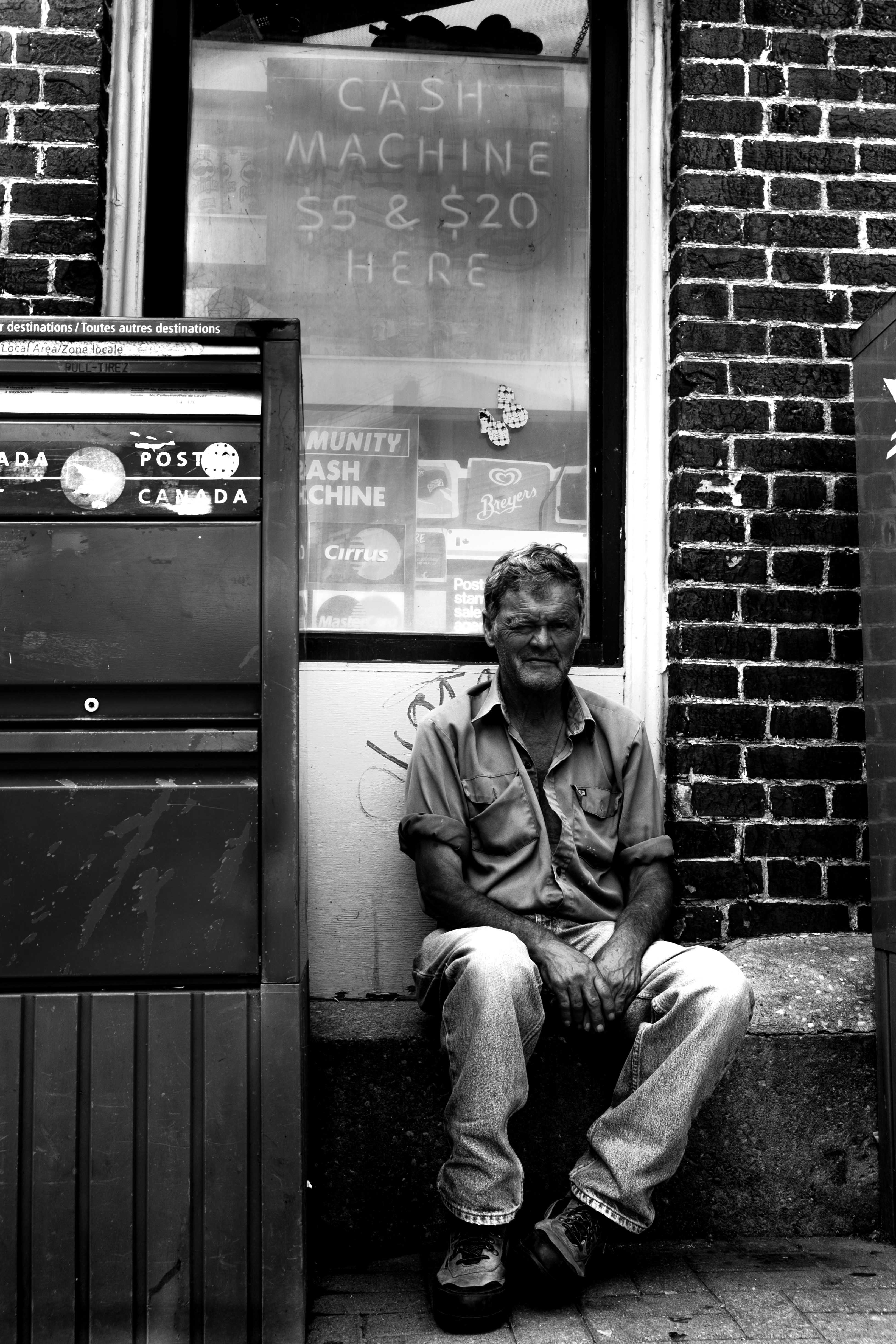 Man in Solace: A Quiet Moment on a City Step